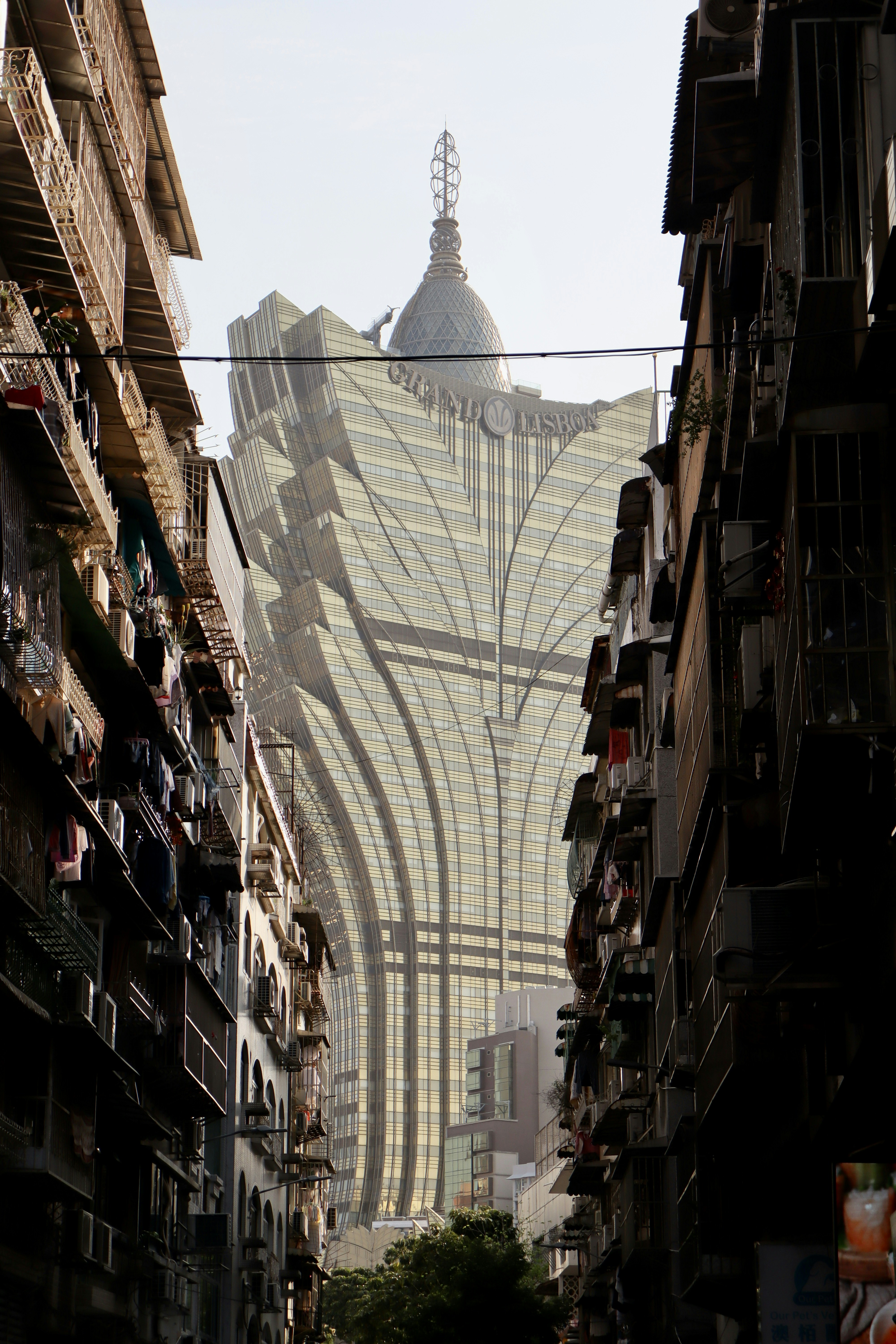 Urban Narrow Corridor Framing the Distinctive Swirl Tower