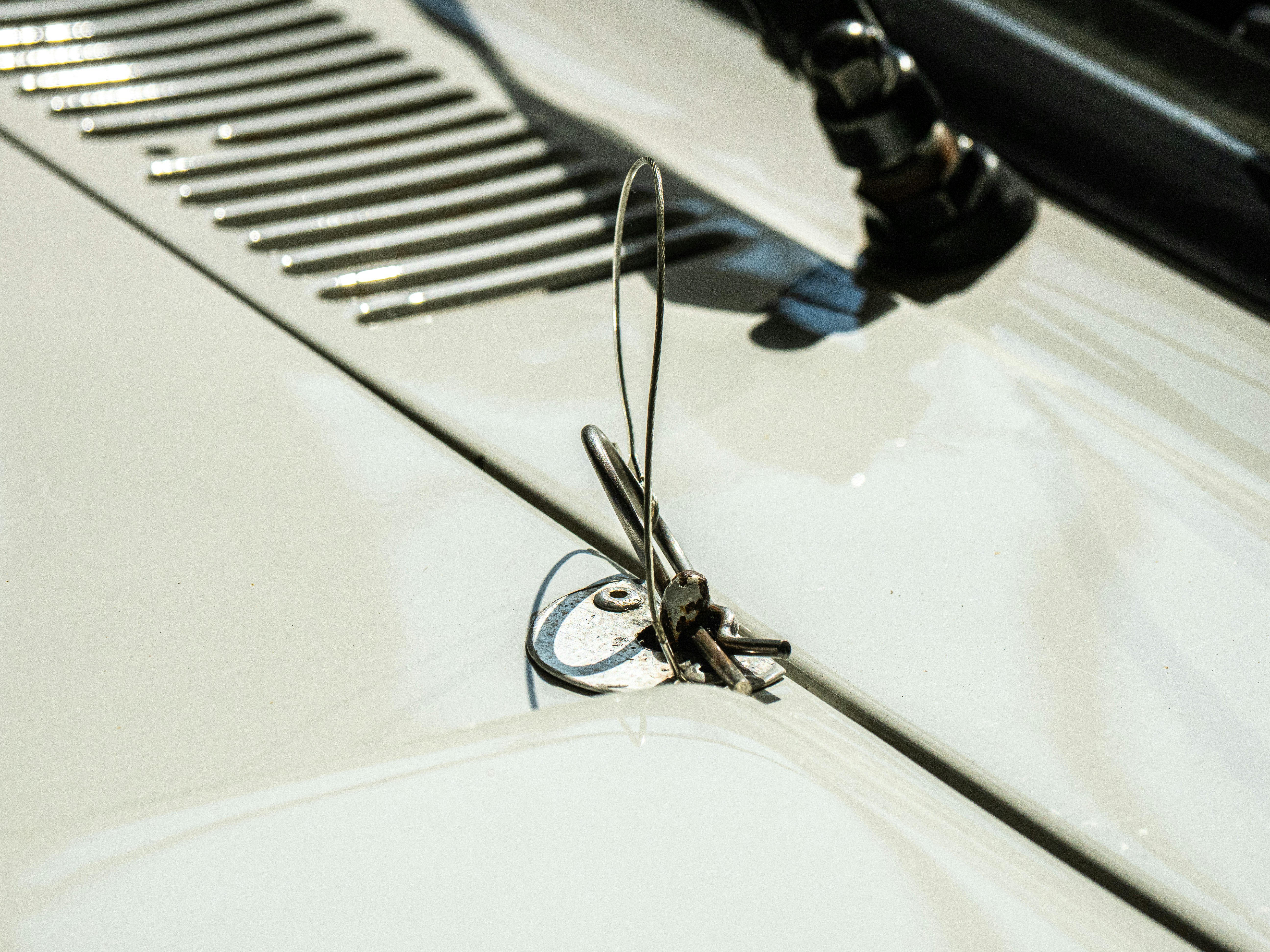 Chrome Hood Ornament On Quiet Vintage Car