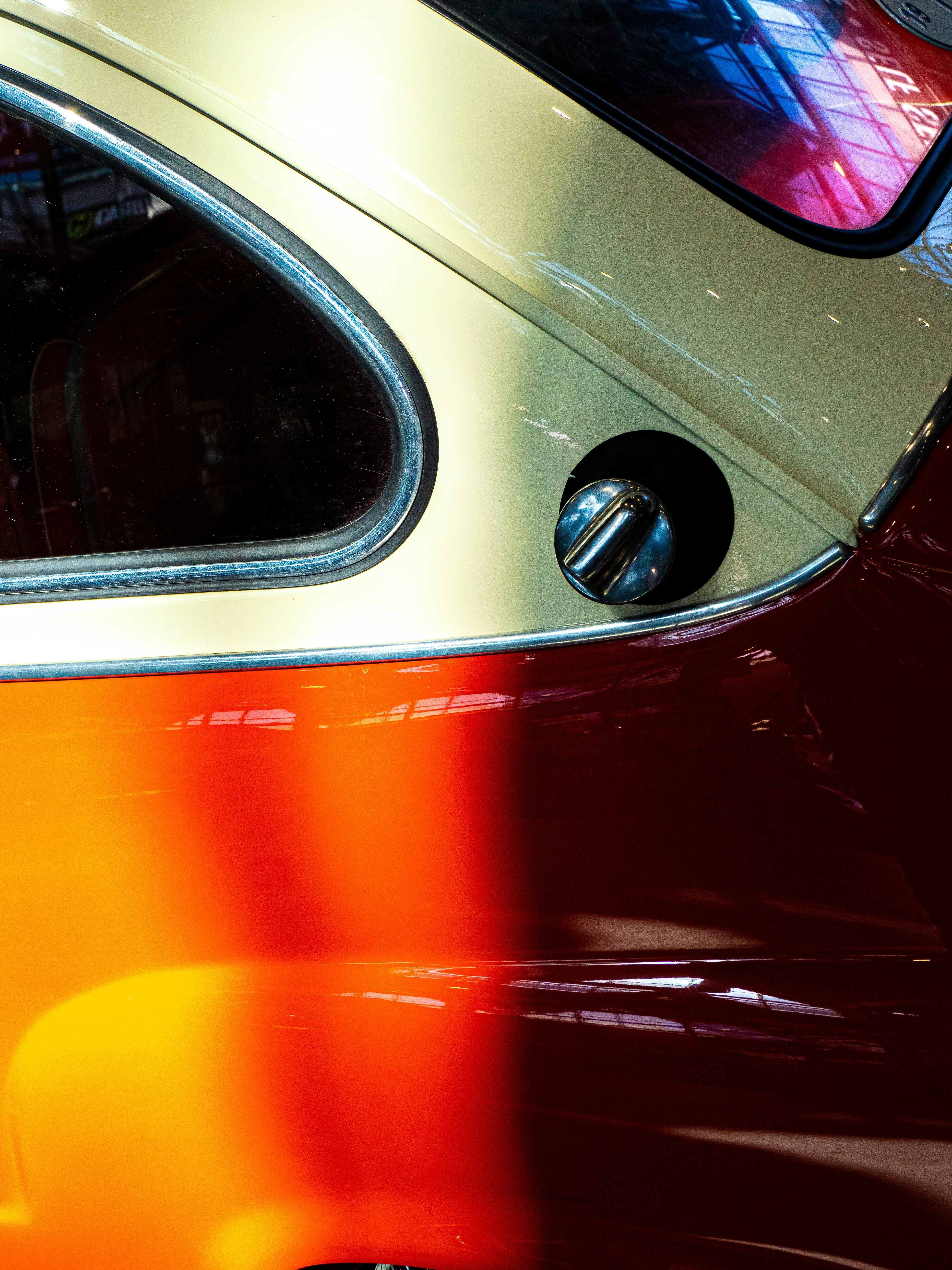 Amber Car Contrast: Chrome Trim and Fuel Cap in a Sunset Blend