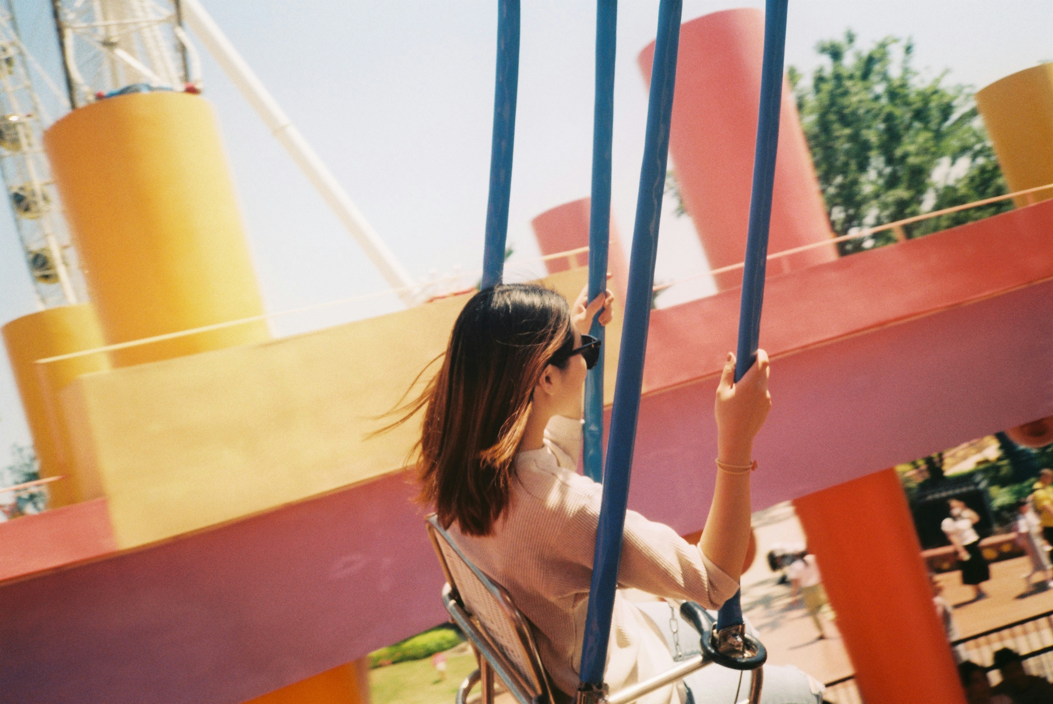 Swinging into a Sunlit Blur of Color and Play