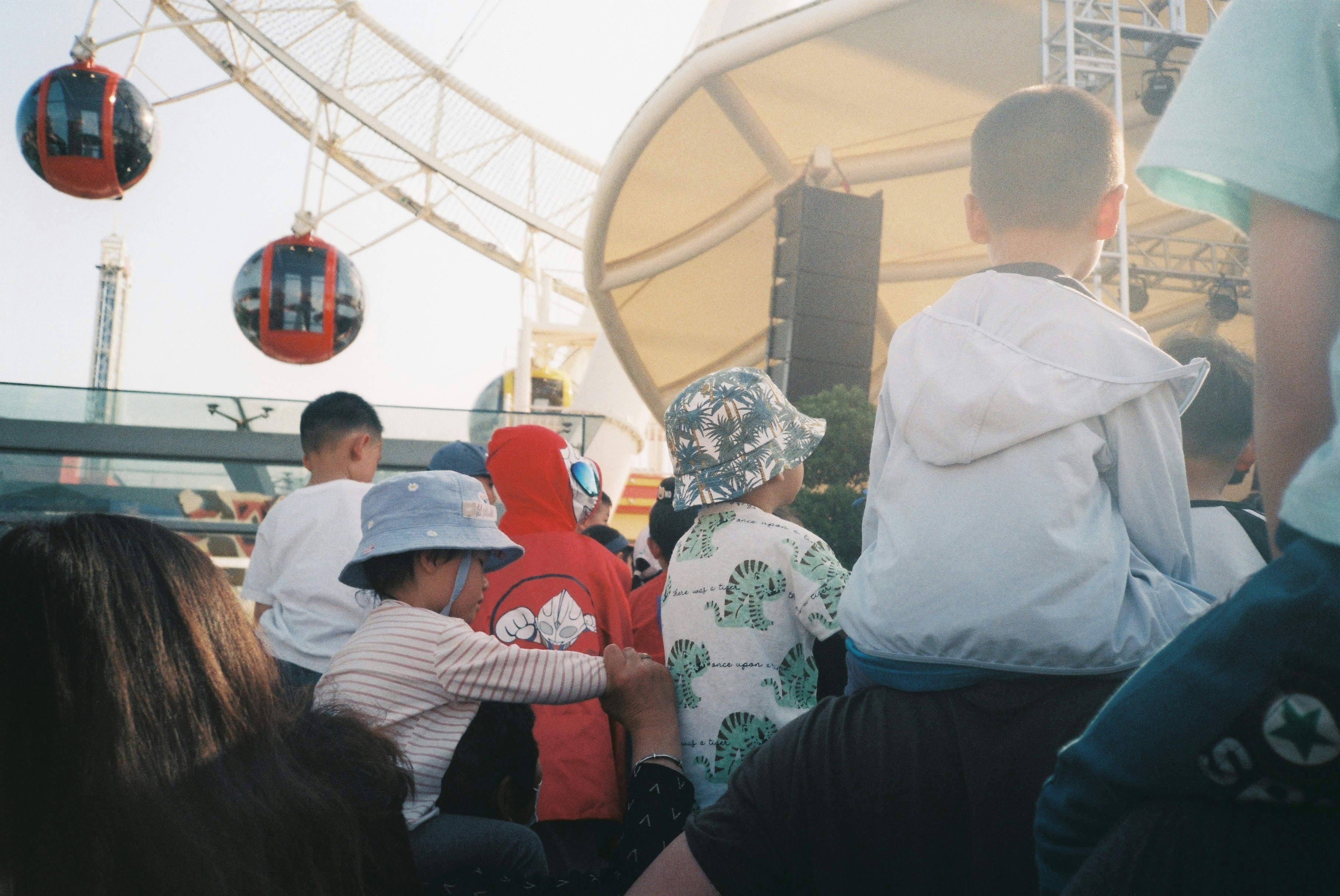 Crowd at a Sunlit Cable Car Transit