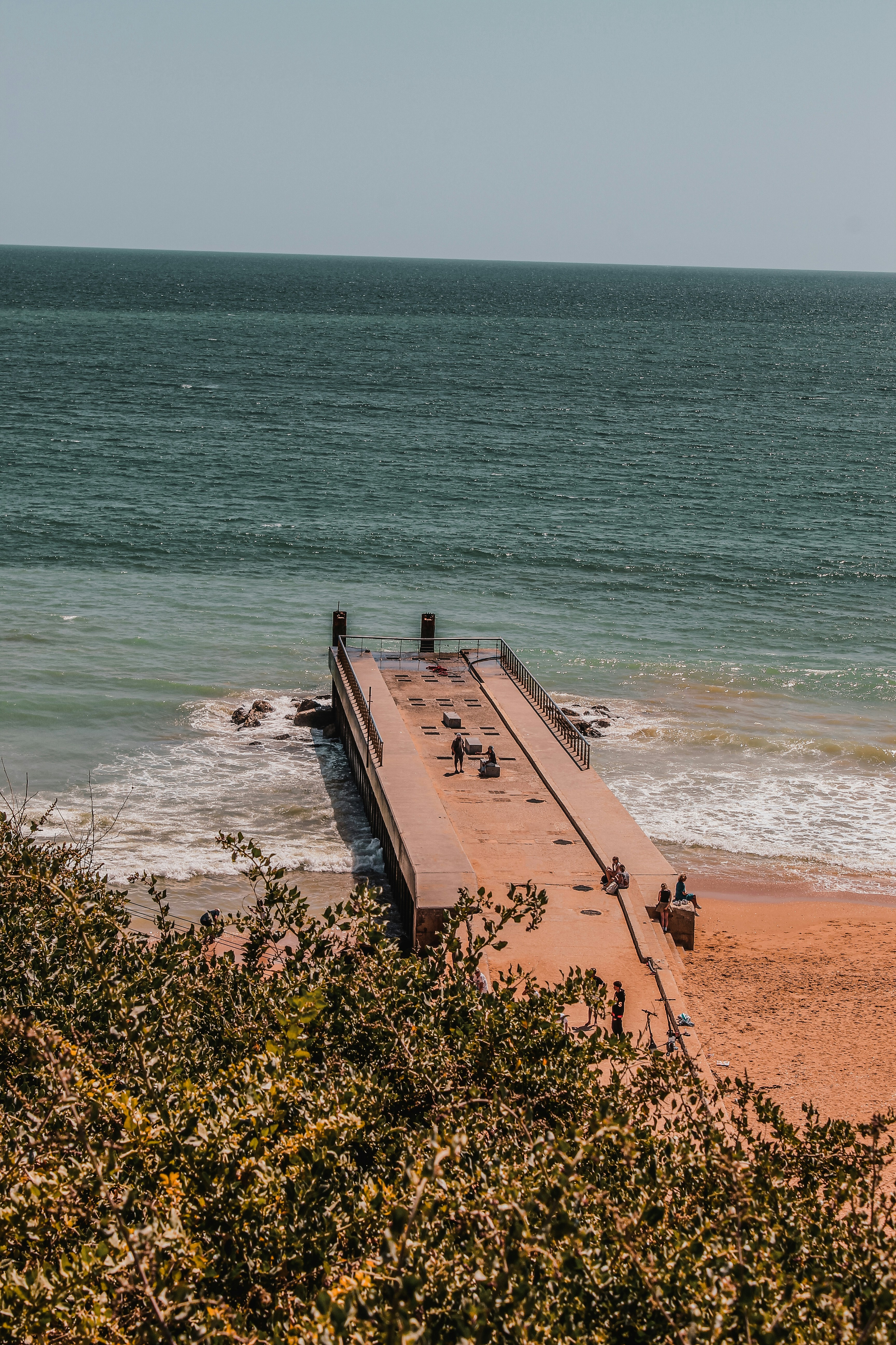 Pier Reaches into a Quiet Atlantic Horizon