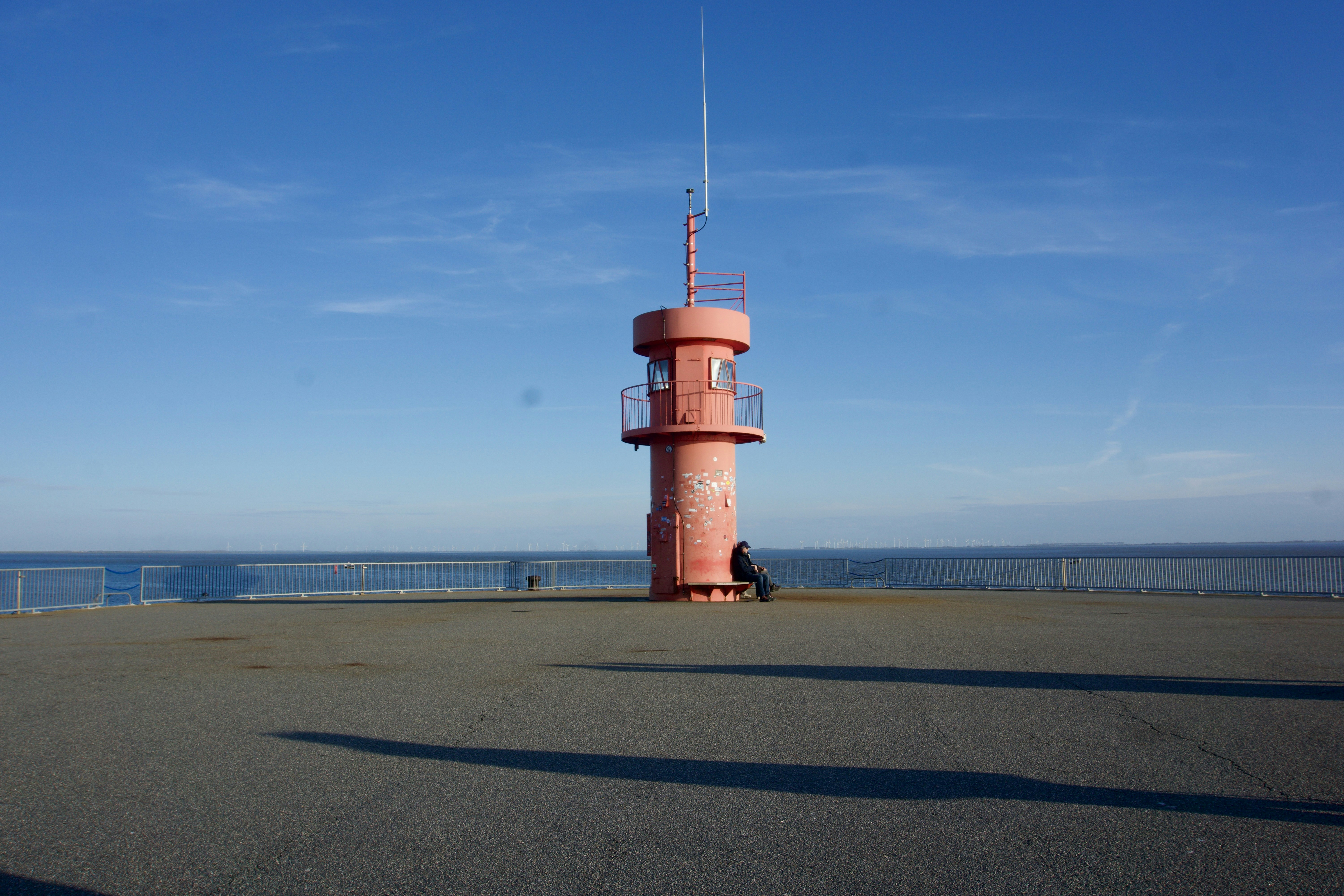 Red Beacon by the Sea: A Quiet Pier Moment