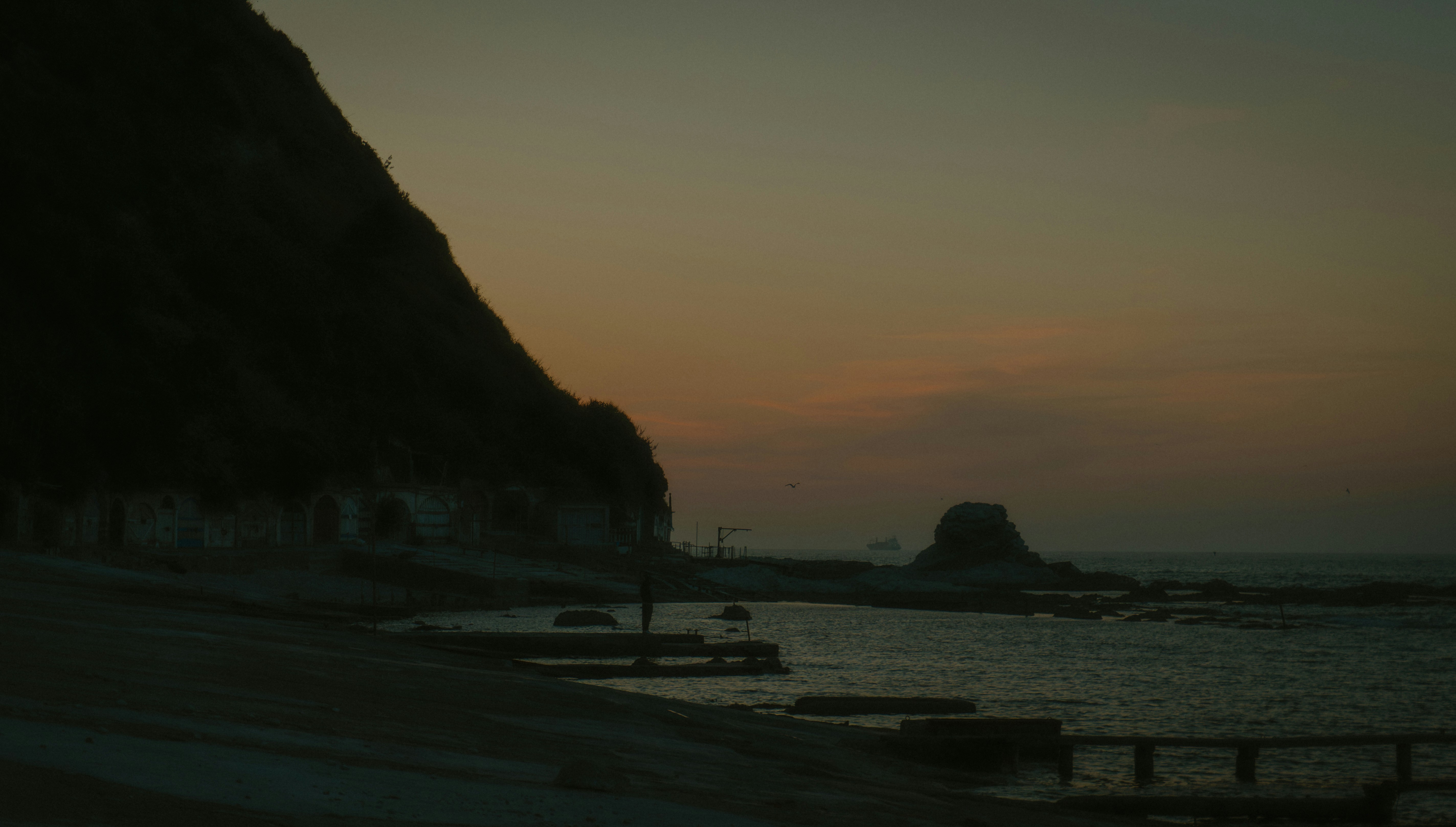 Twilight Shores: Boats Rest Against a Quiet Dusk