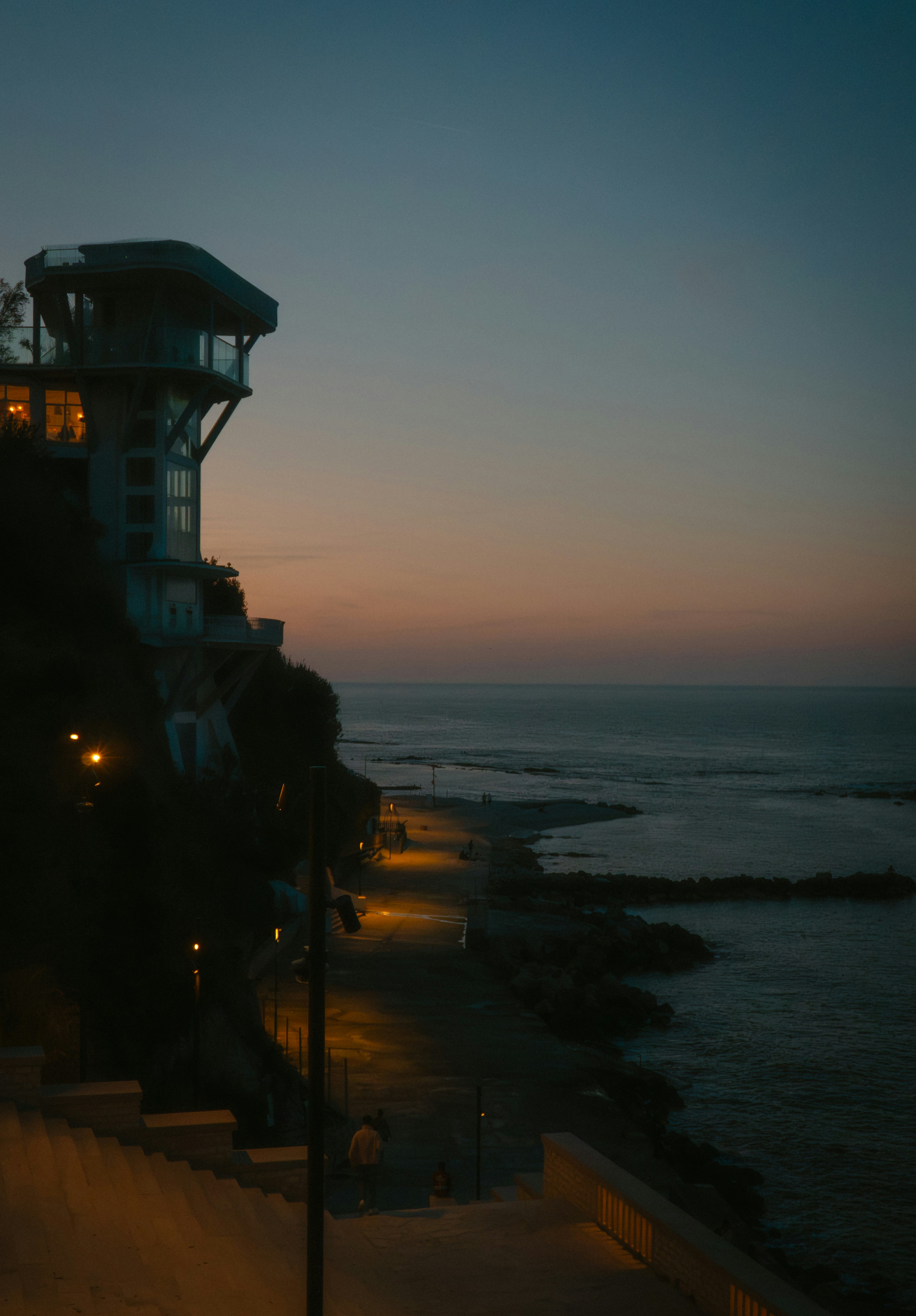 Twilight Watchtower Overlooking a Quiet Coastal Path