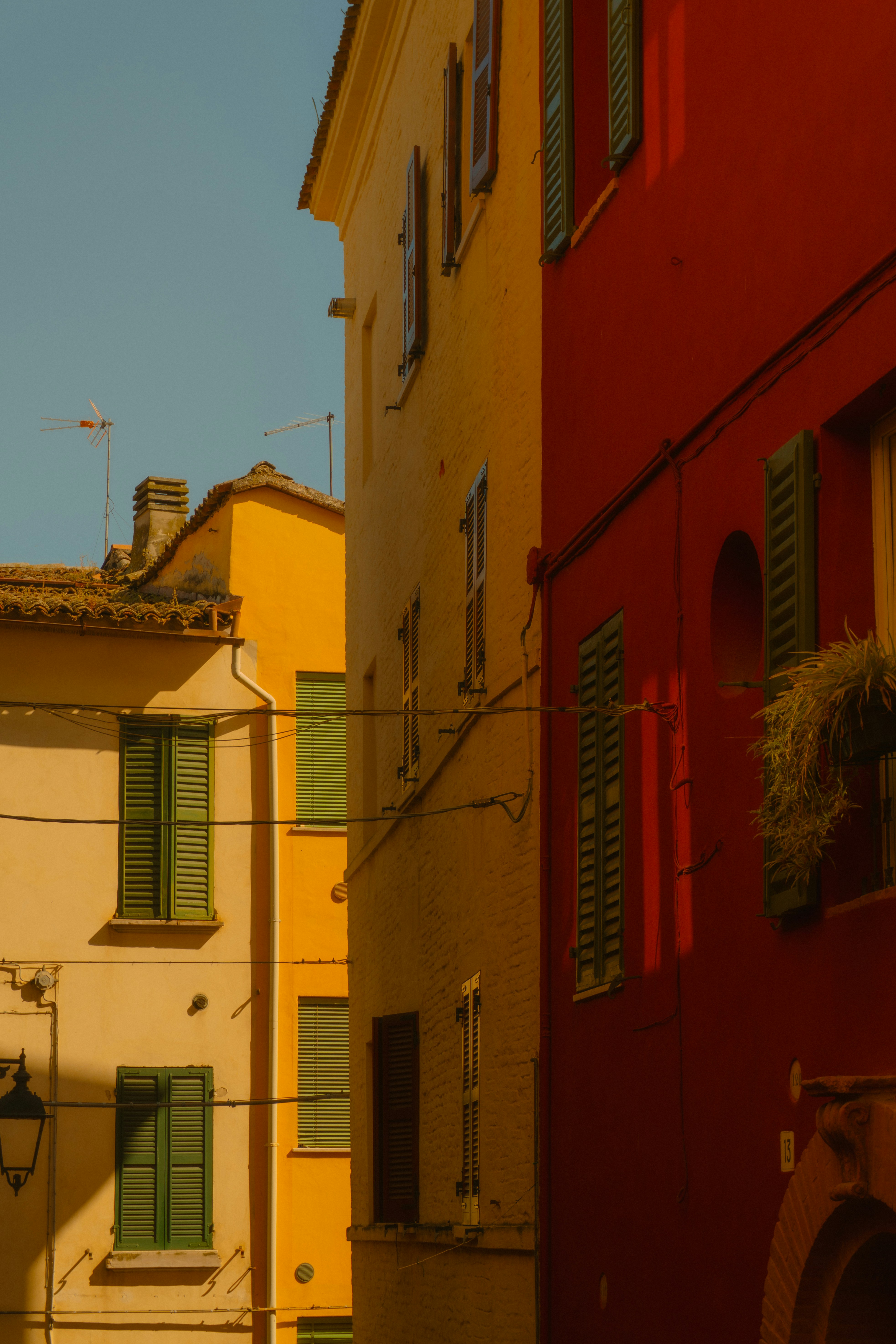Sunlit Facades in a Tuscan Alley