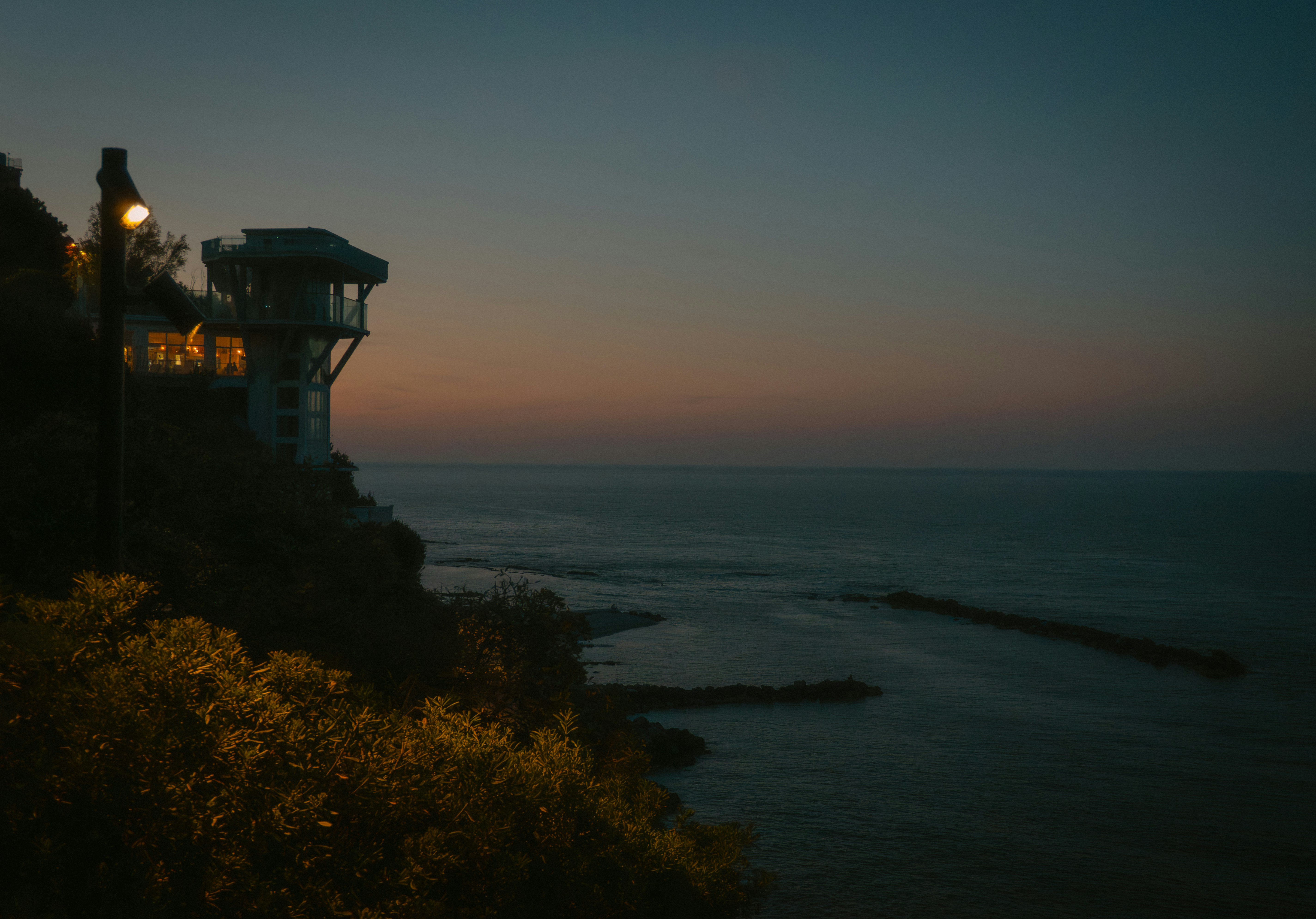 Dusk Watchtower Over the Quiet Sea