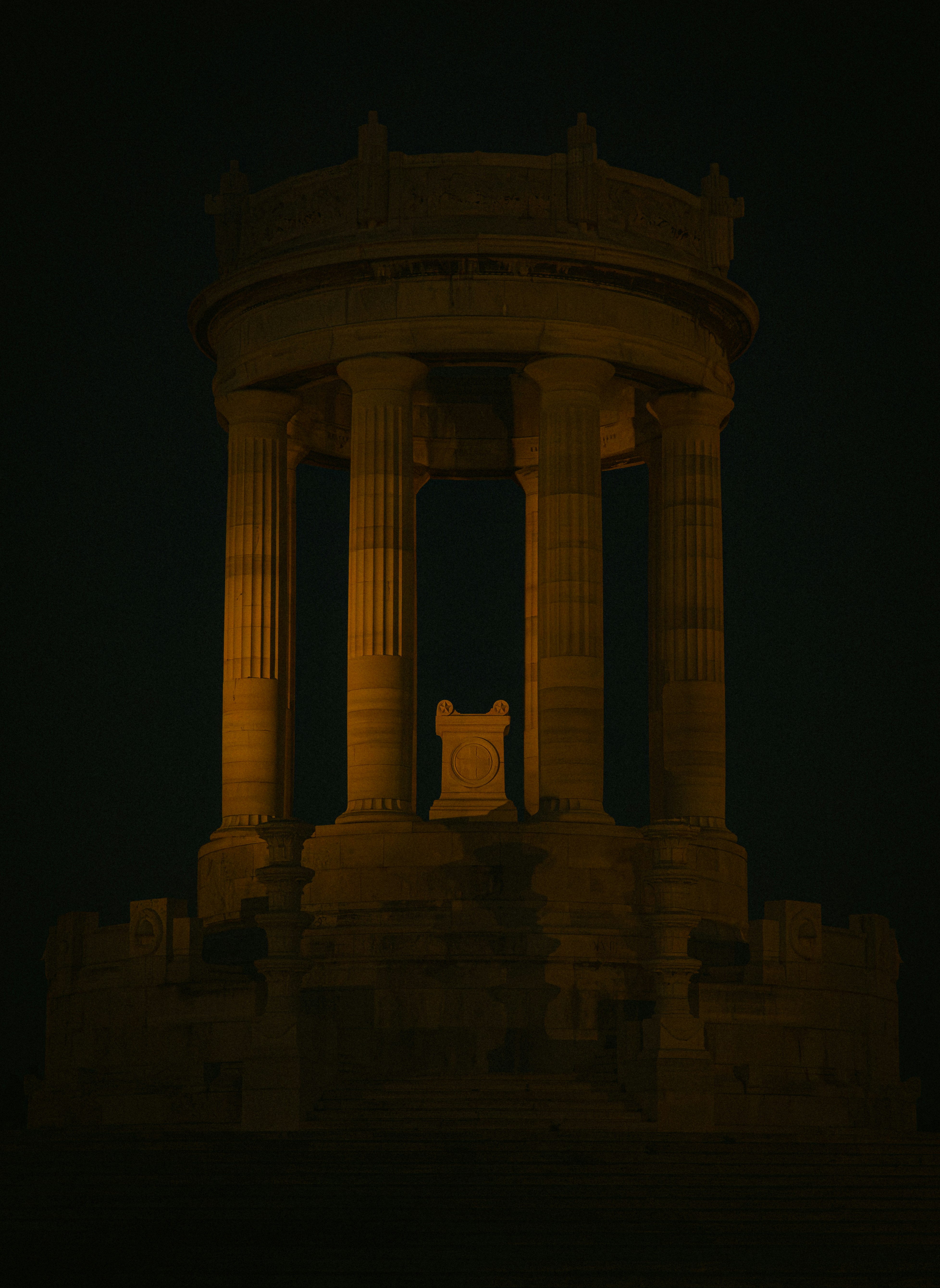 Moonlit Temple: A Circular Monument Emerges from the Darkness