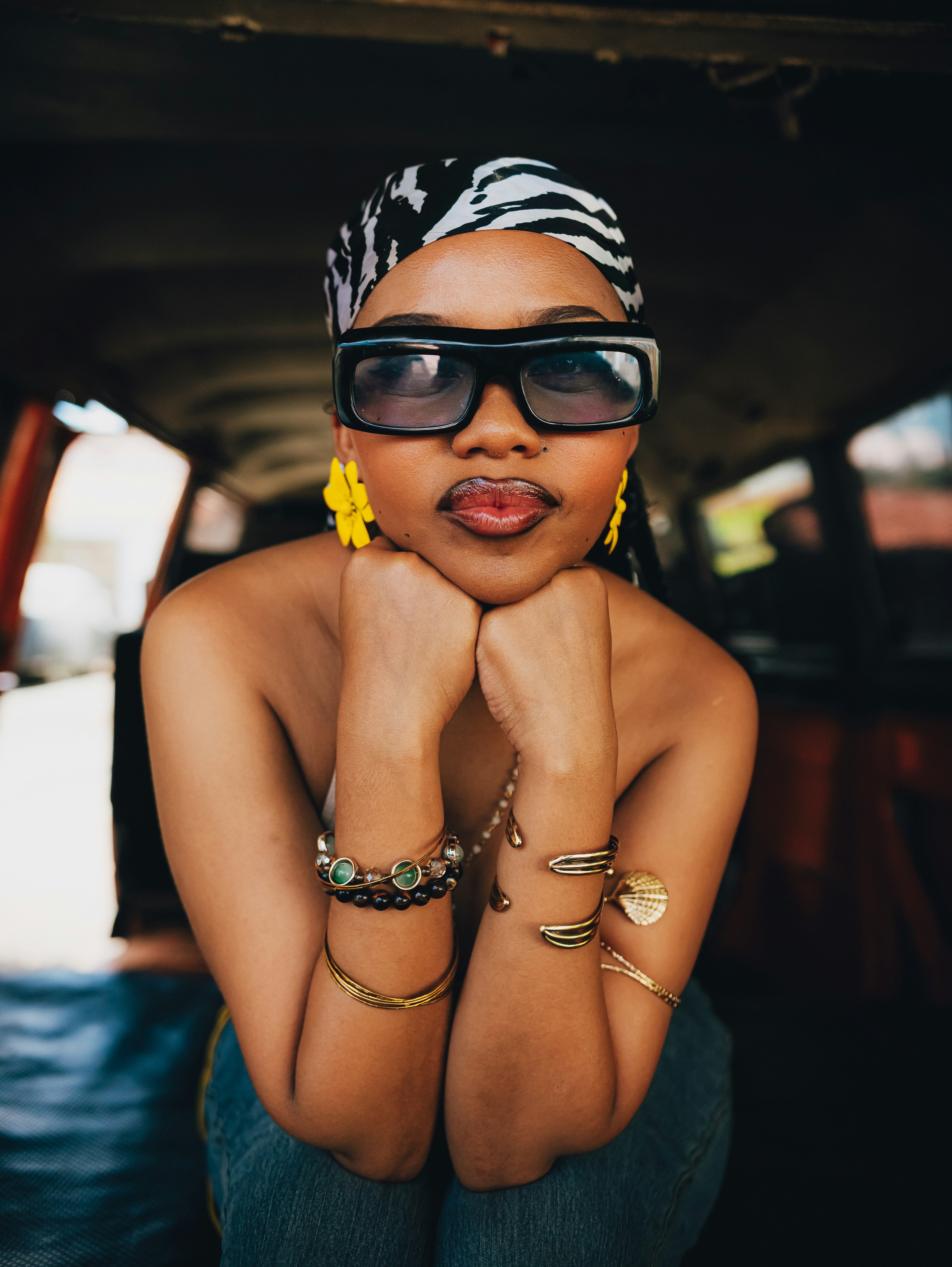 Eyes Behind the Shades: A Portrait of Confidence