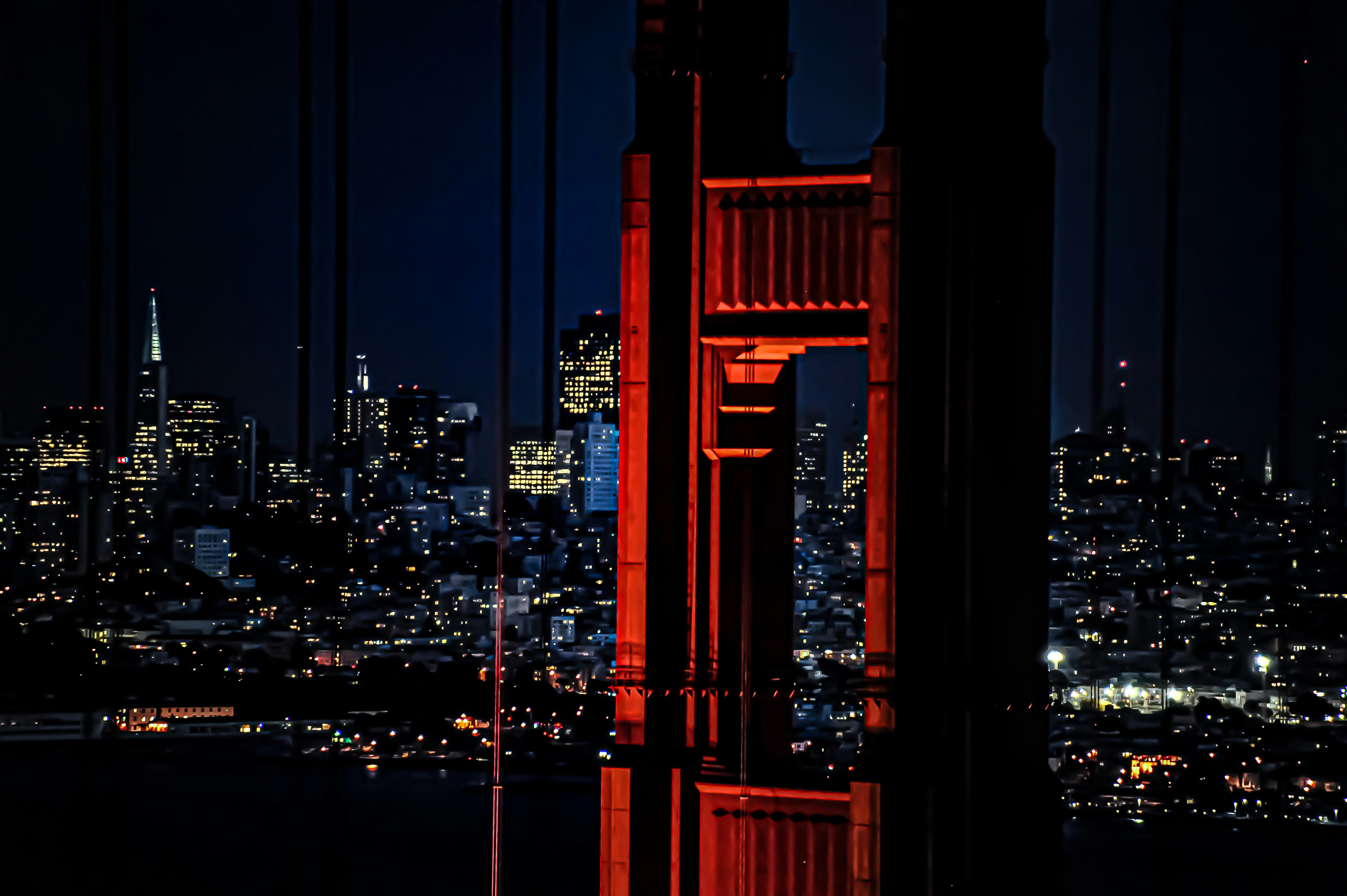 Crimson Tower: Night Vigil Over the Bay Bridge