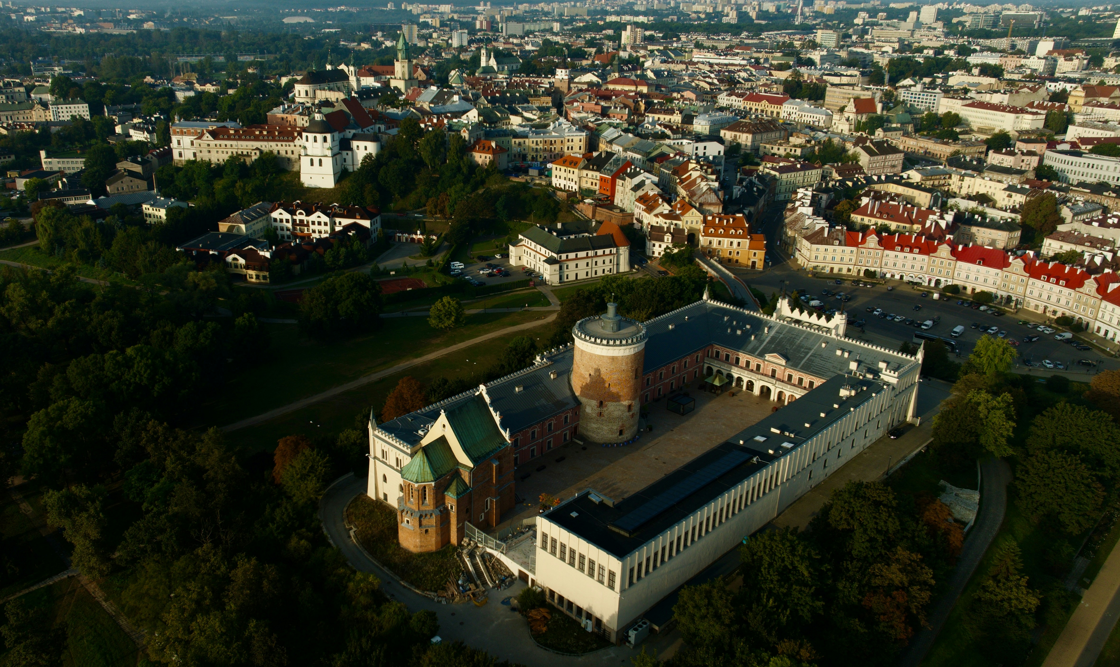 Aerial View Over a Historic Complex: Courtyard, Turrets and Surrounding City