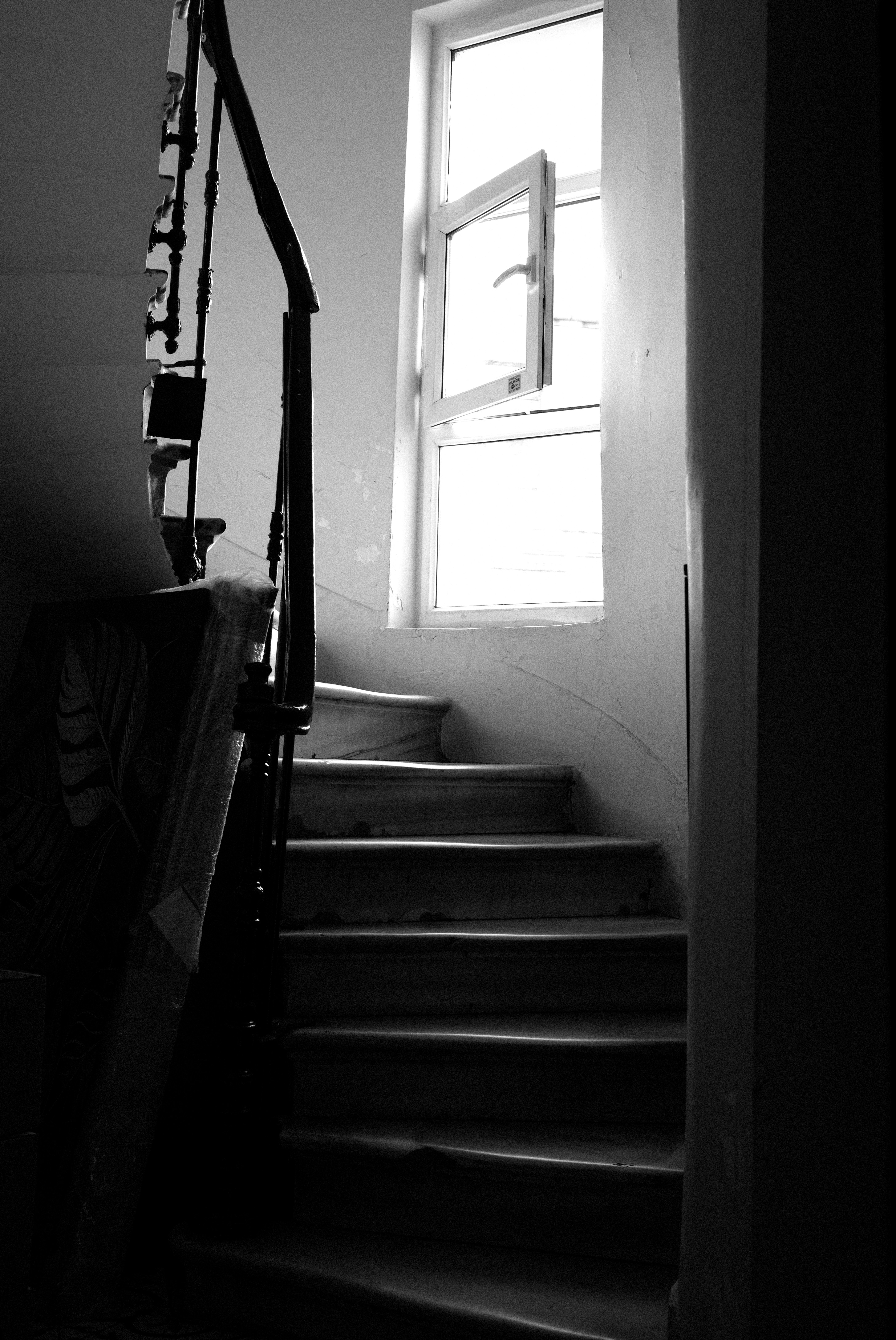 Stairwell Light: A Quiet Descent into Shadowed Space