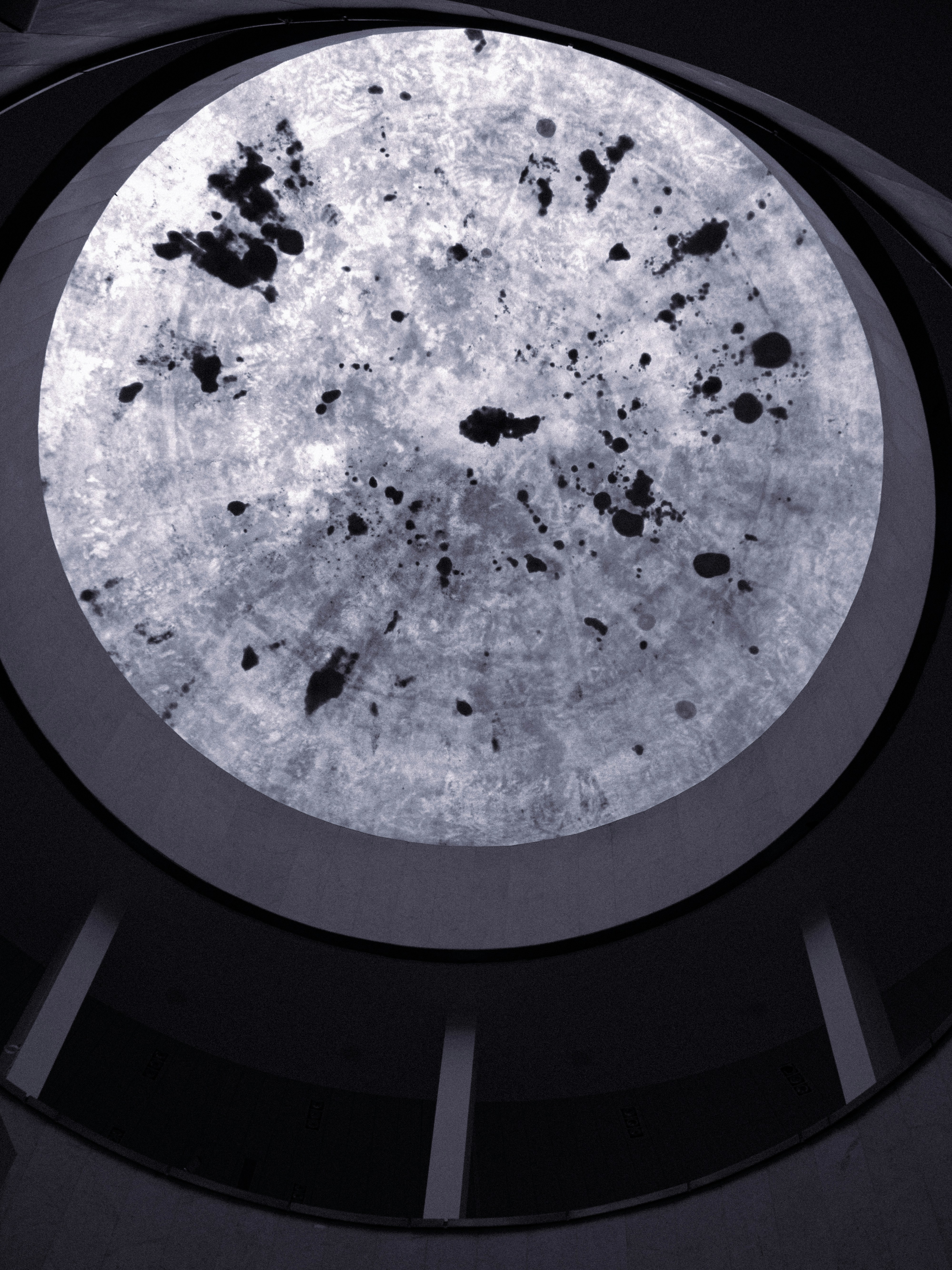Looking Up at the Moonlit Atrium