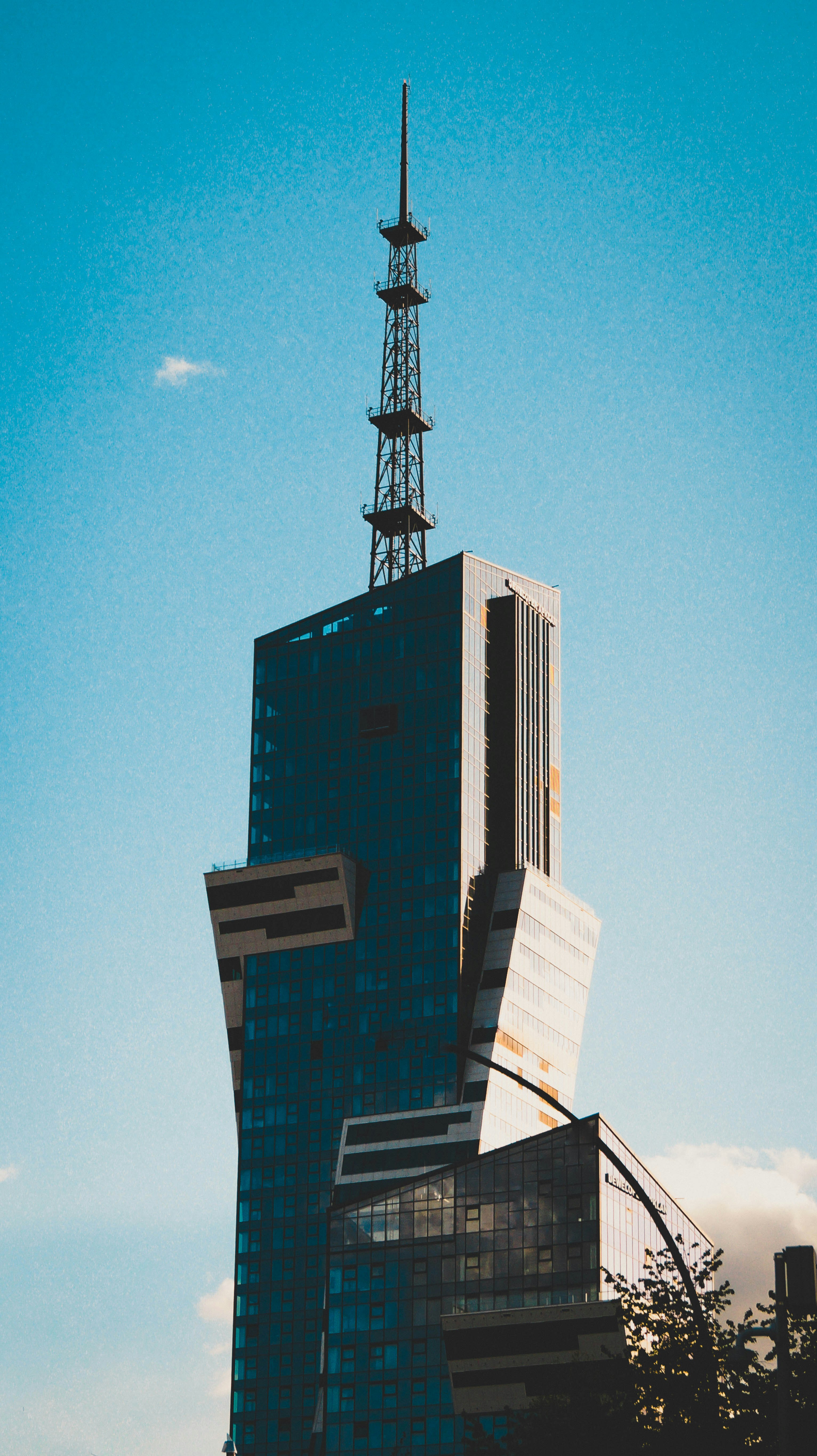 Skyward Spine: A Tower Piercing the Bright Skyline