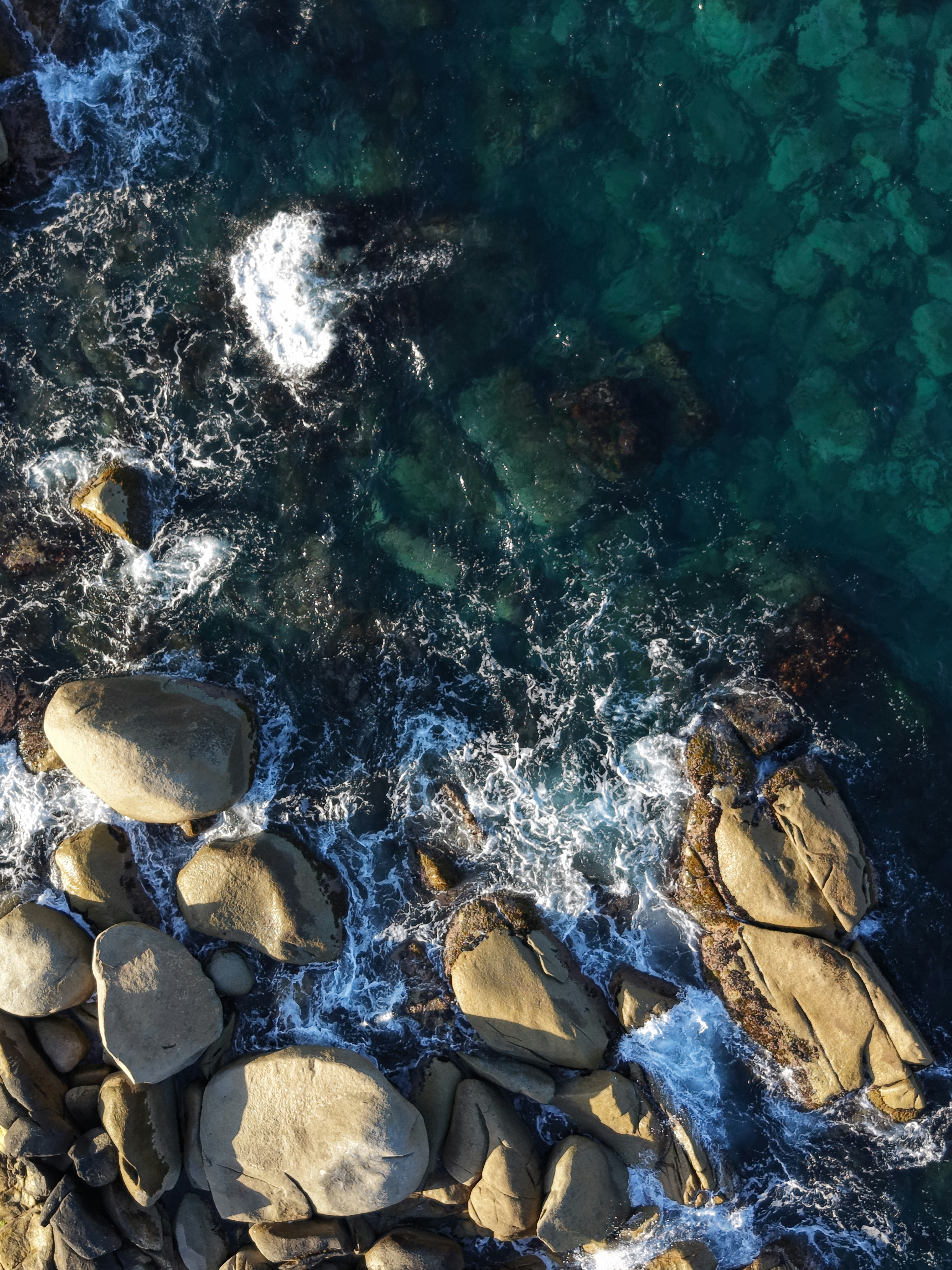 Ocean Corridor: Light, Rocks, and Rushing Whitecaps