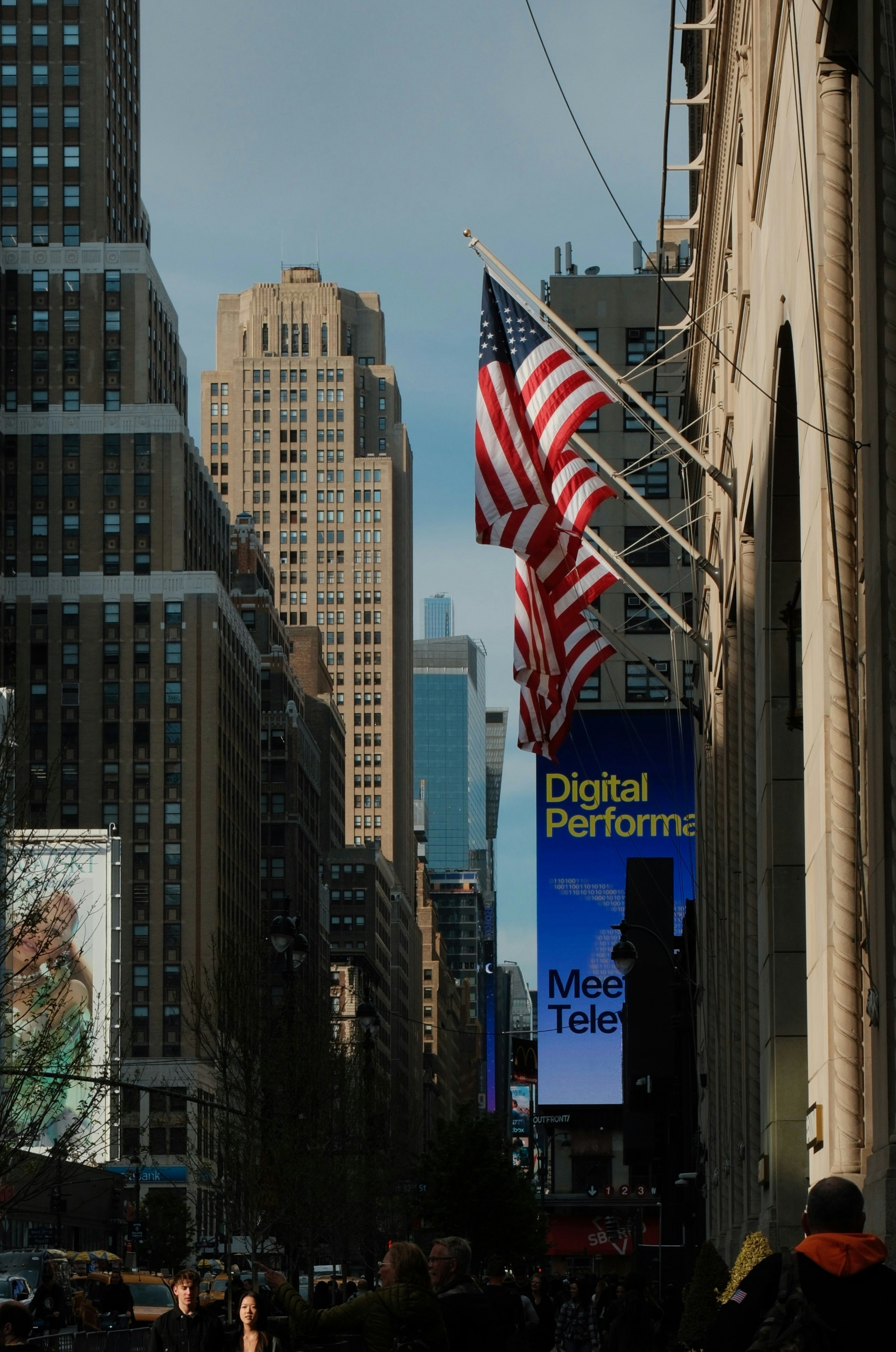 Flagged Promenade: American Flags Over a City Street