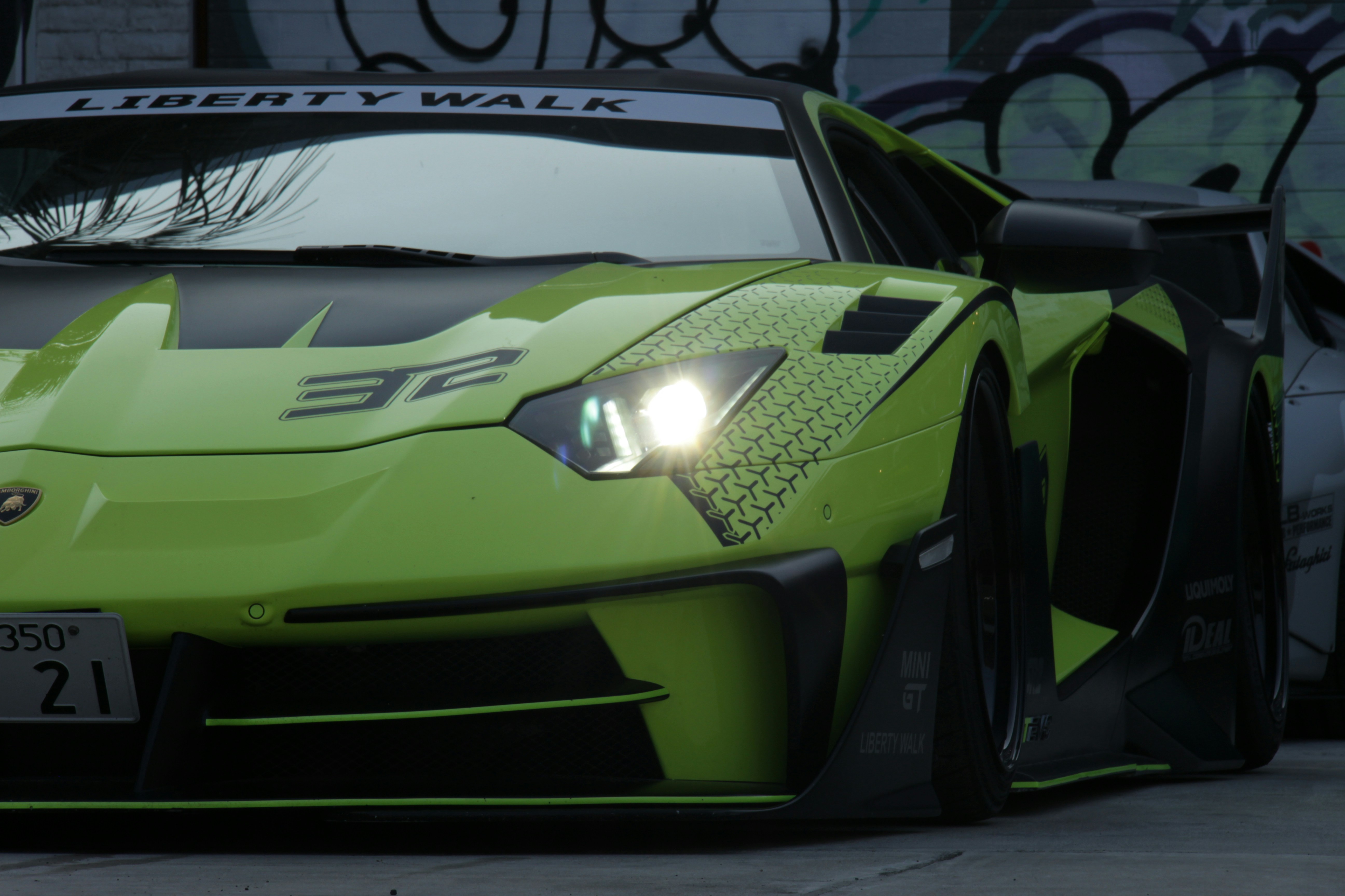 Neon-green Lamborghini Aventador on urban rampage