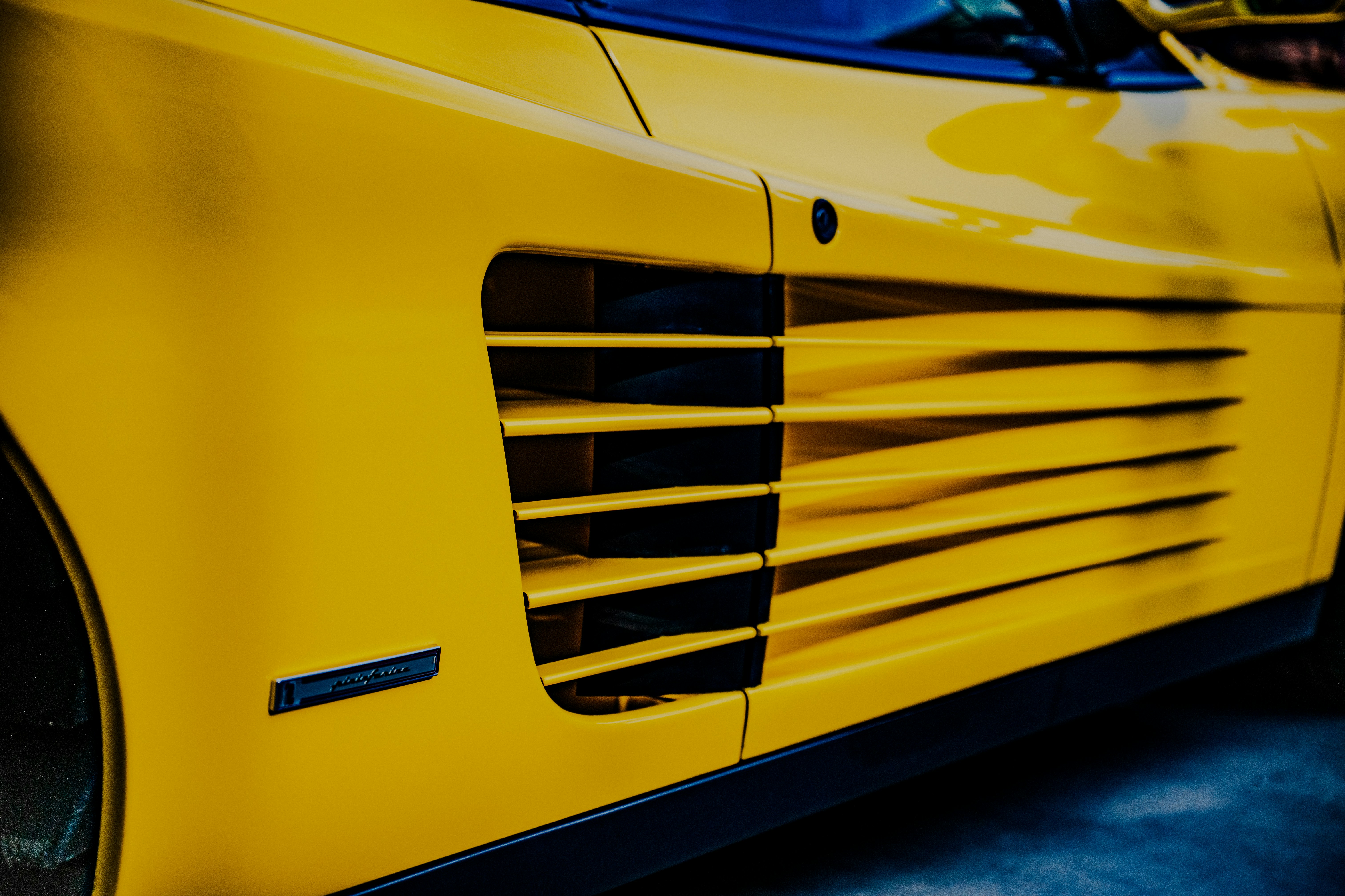 Yellow Power: The Side of a Bold V8 Engine in Focus