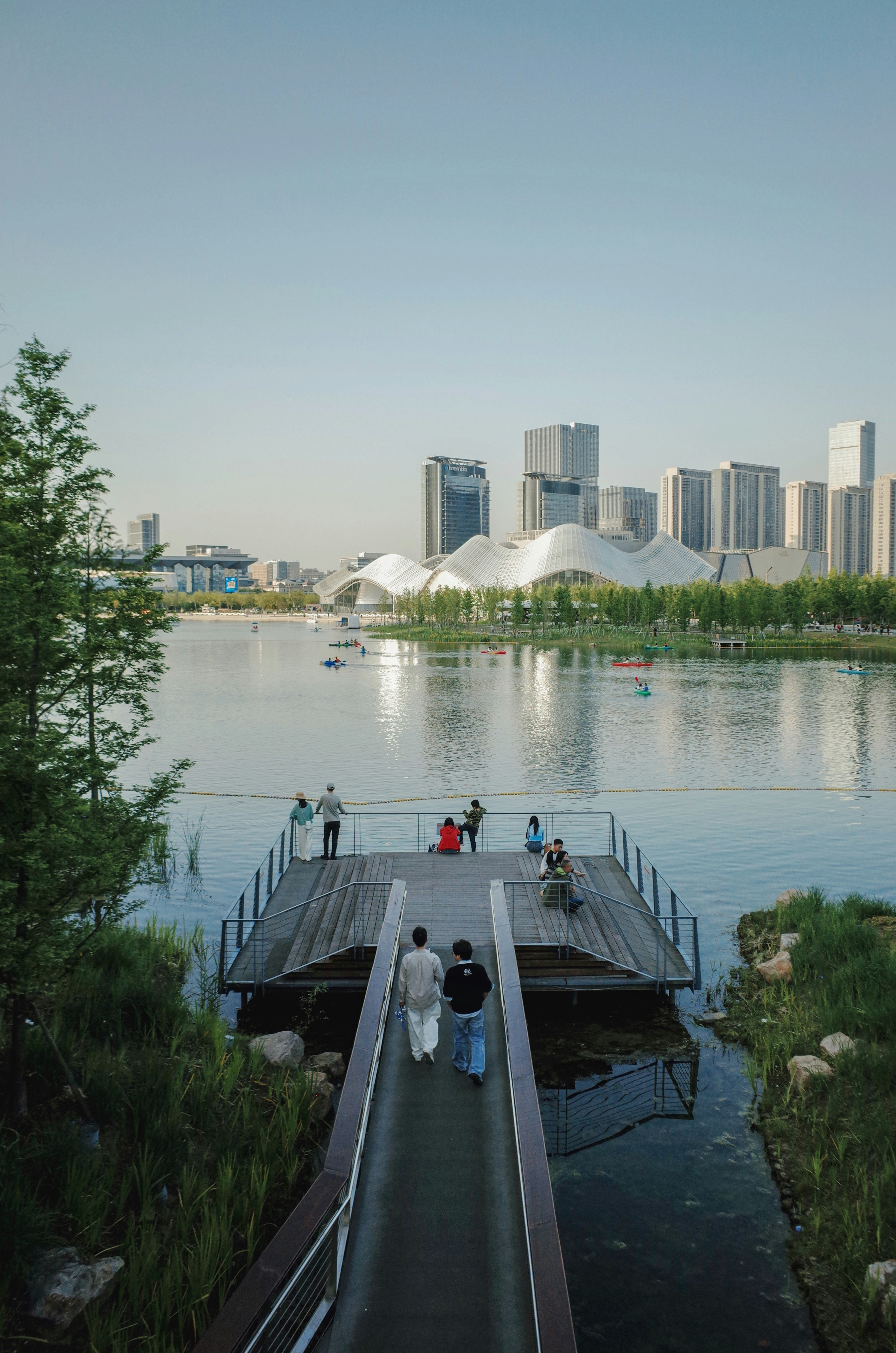 Bridge into a Quiet City Lake: A Walk Toward the Waterfront
