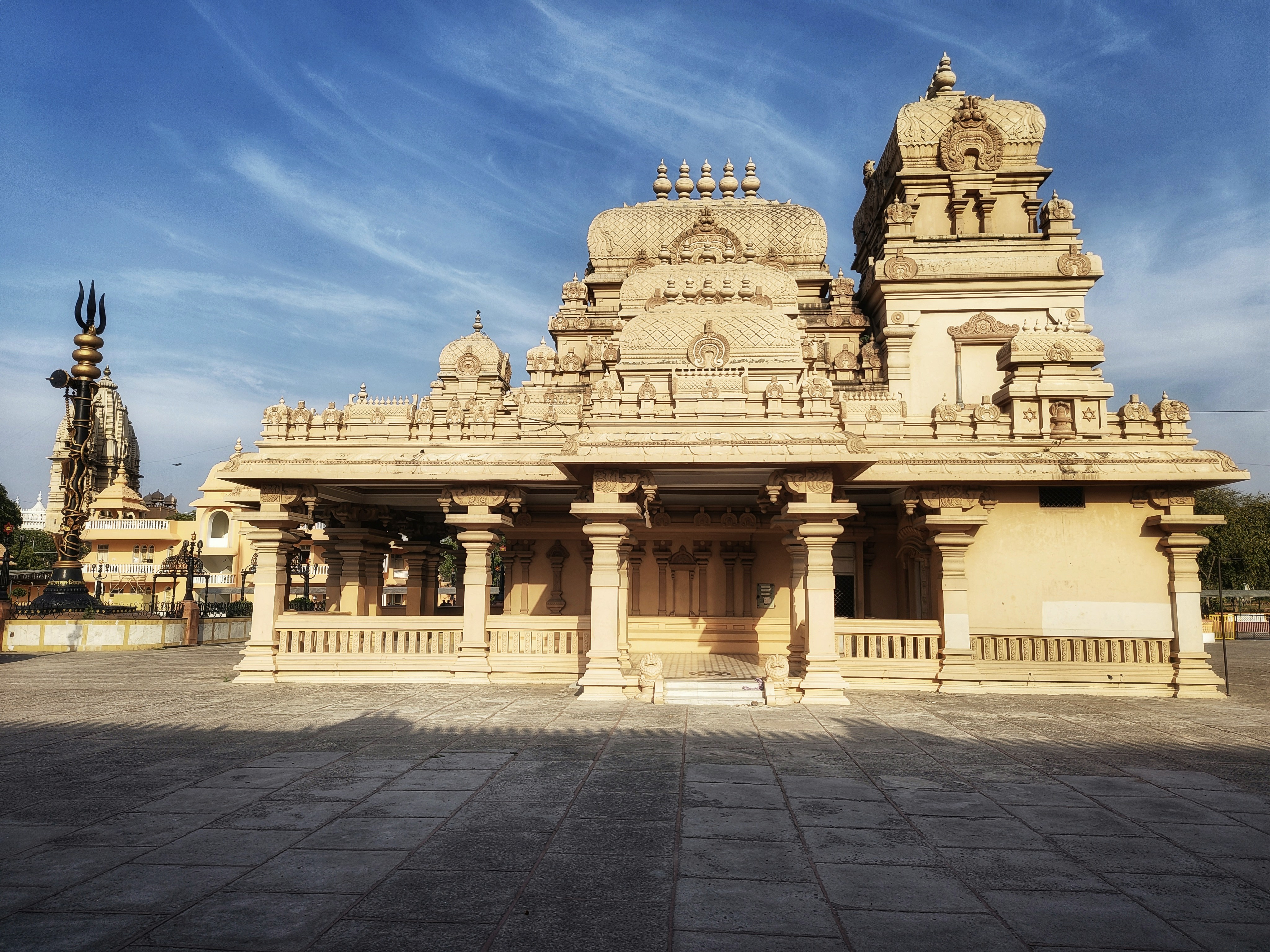 Stone Temple Under A Vast Blue Sky
