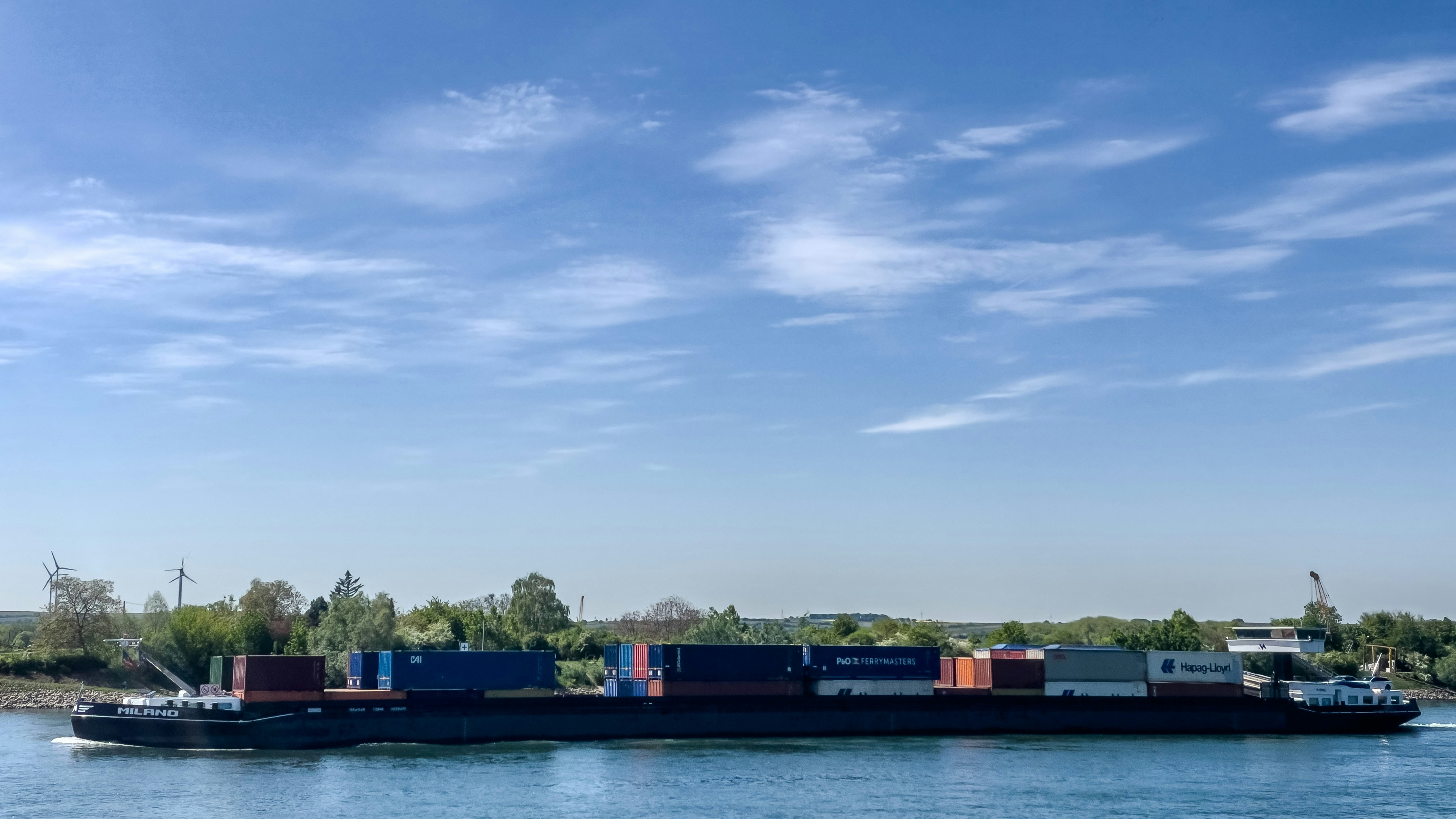 Container Ship Crossing the River