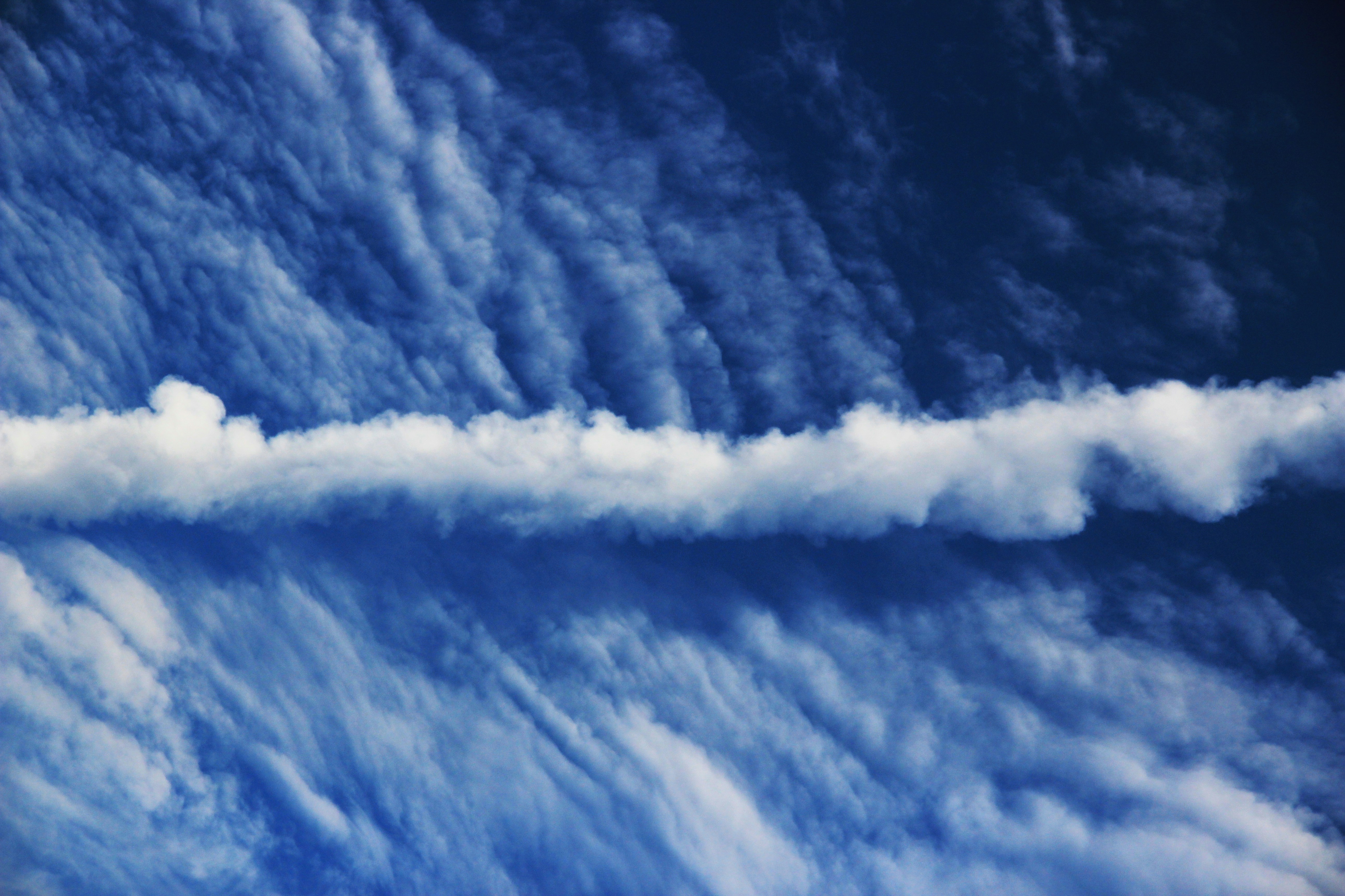 Contrail Crossing a Vivid Sky