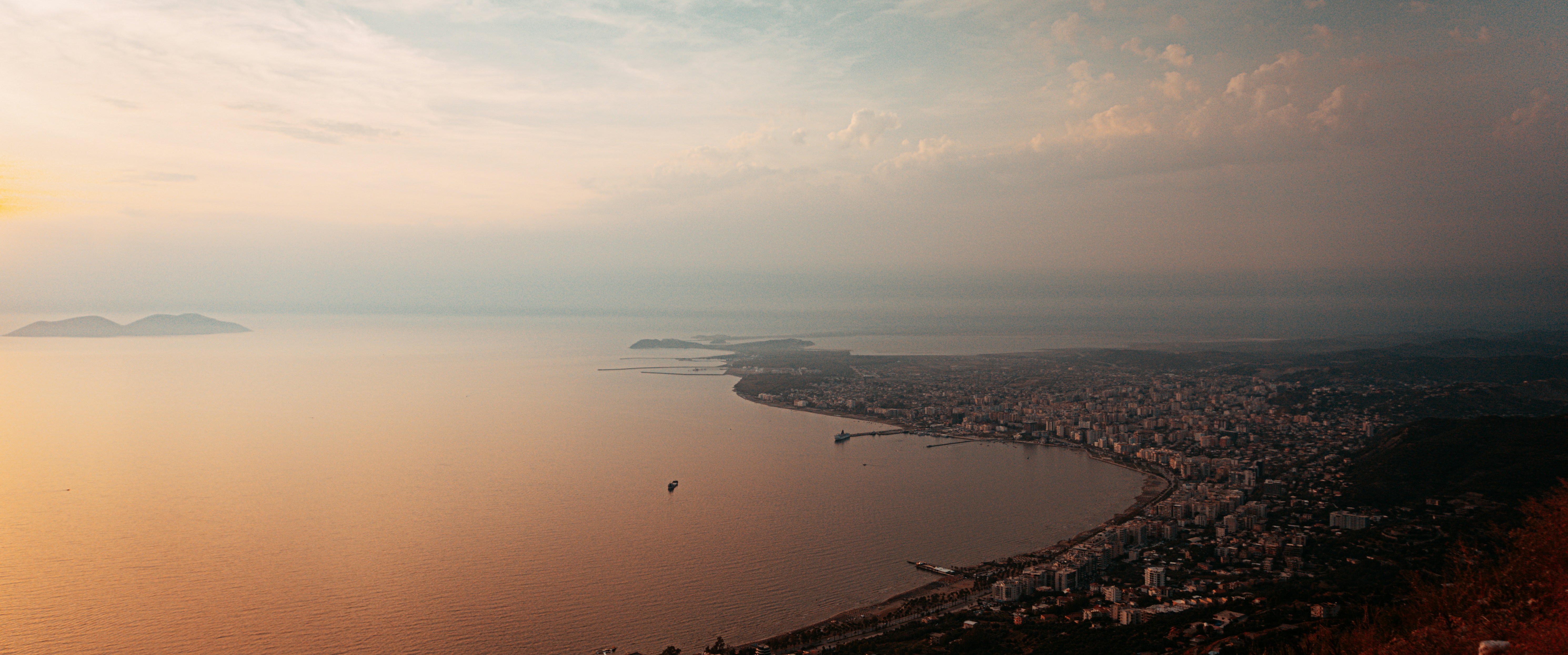 Dawn over the Serene Bay: A Aerial Quiet