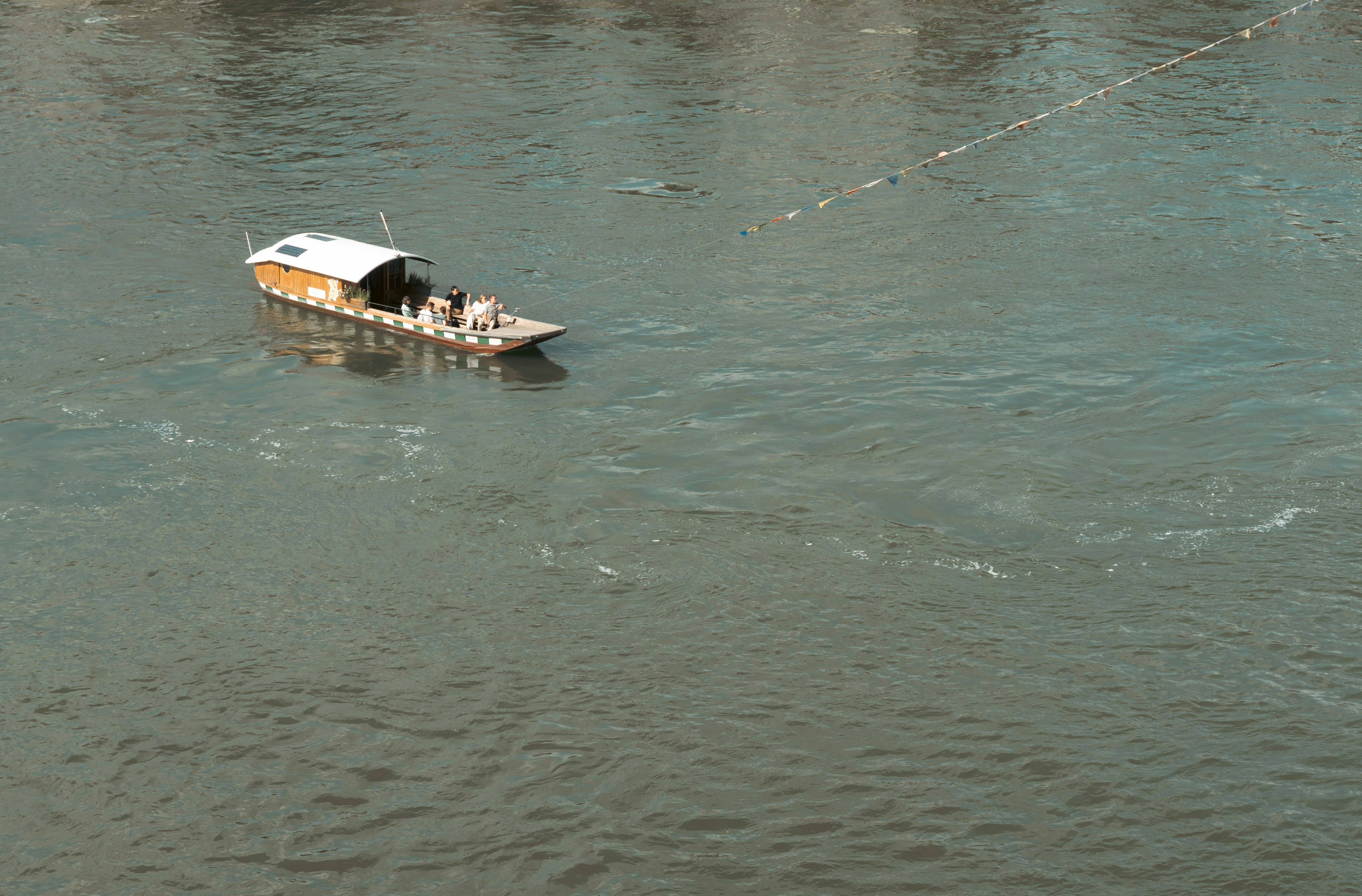 Boat Drifting Along a Quiet River