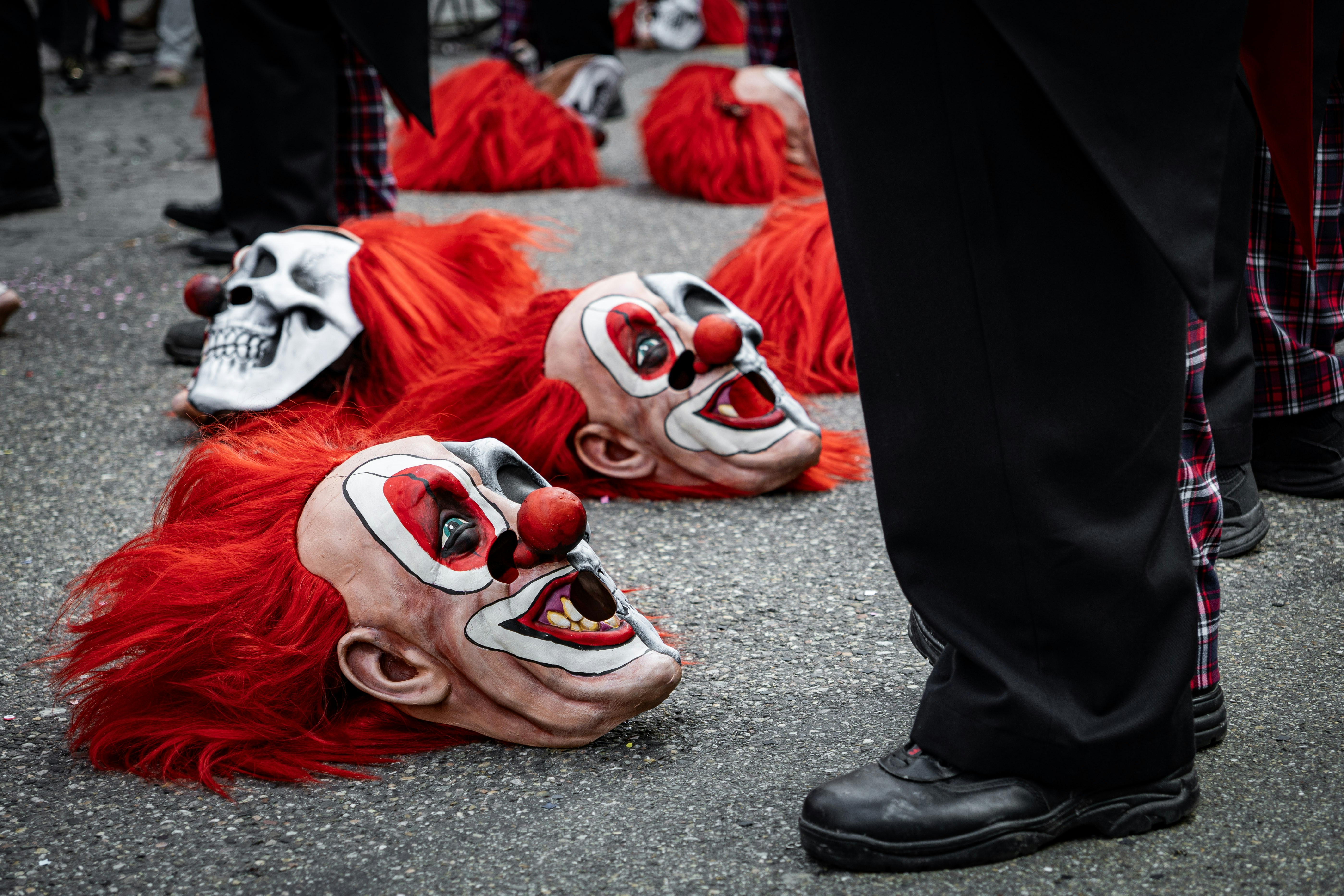 Red Clown Masquerade: Ground-Level Ghouls in Parade