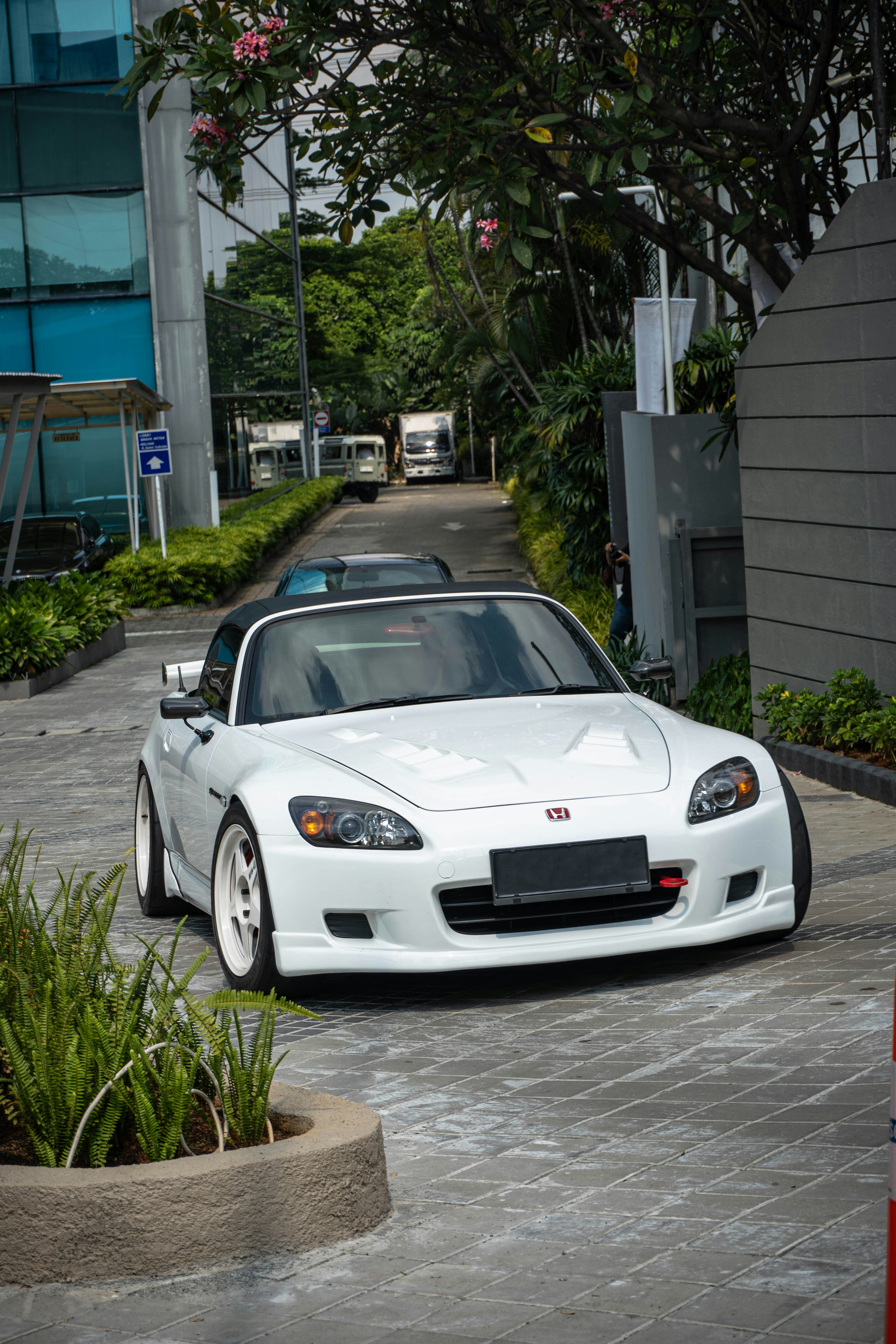 White Honda S2000 on a Curving Circuit of Urban Drive