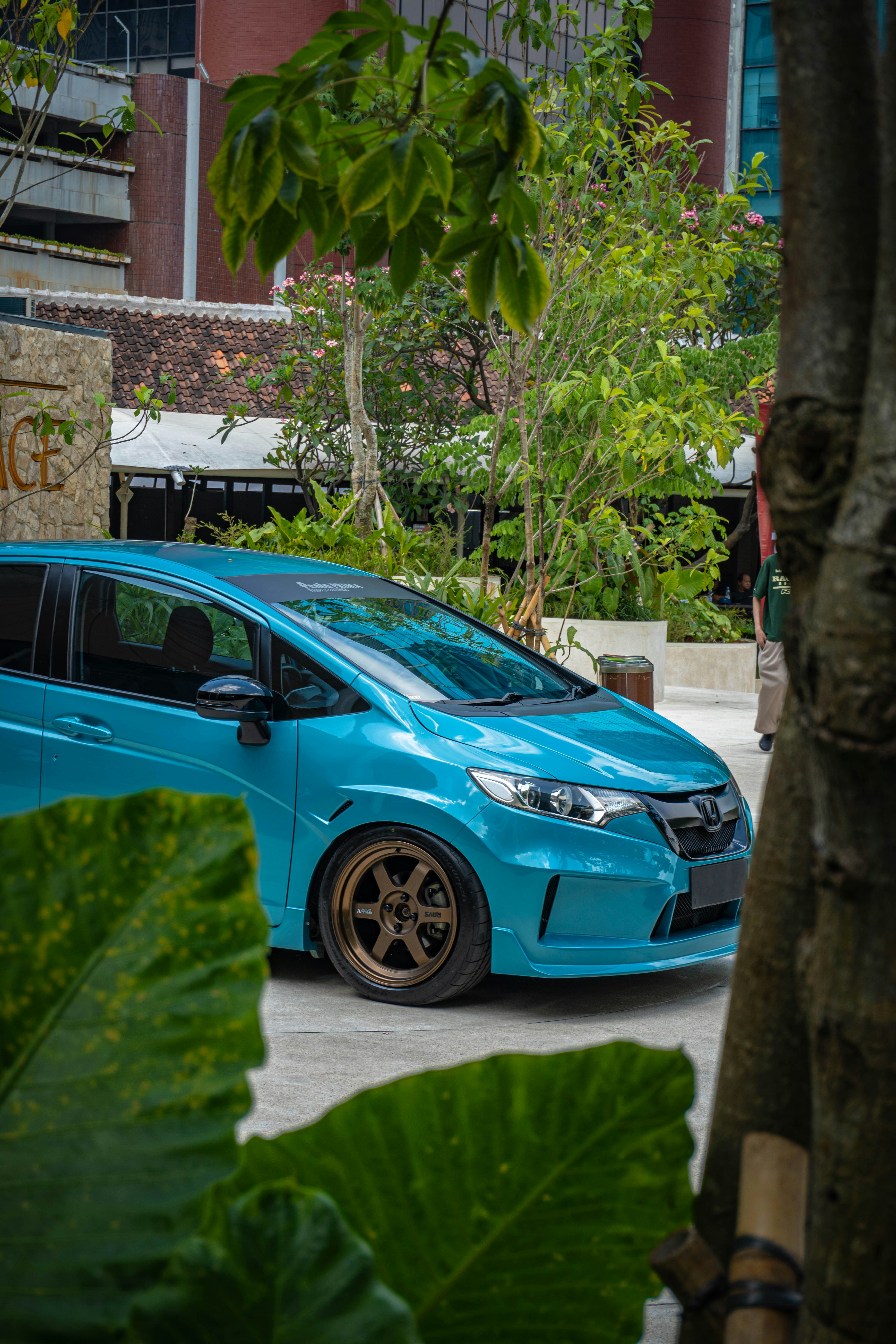 Azure Metro: A Bright Honda Stands Out in the Urban Jungle