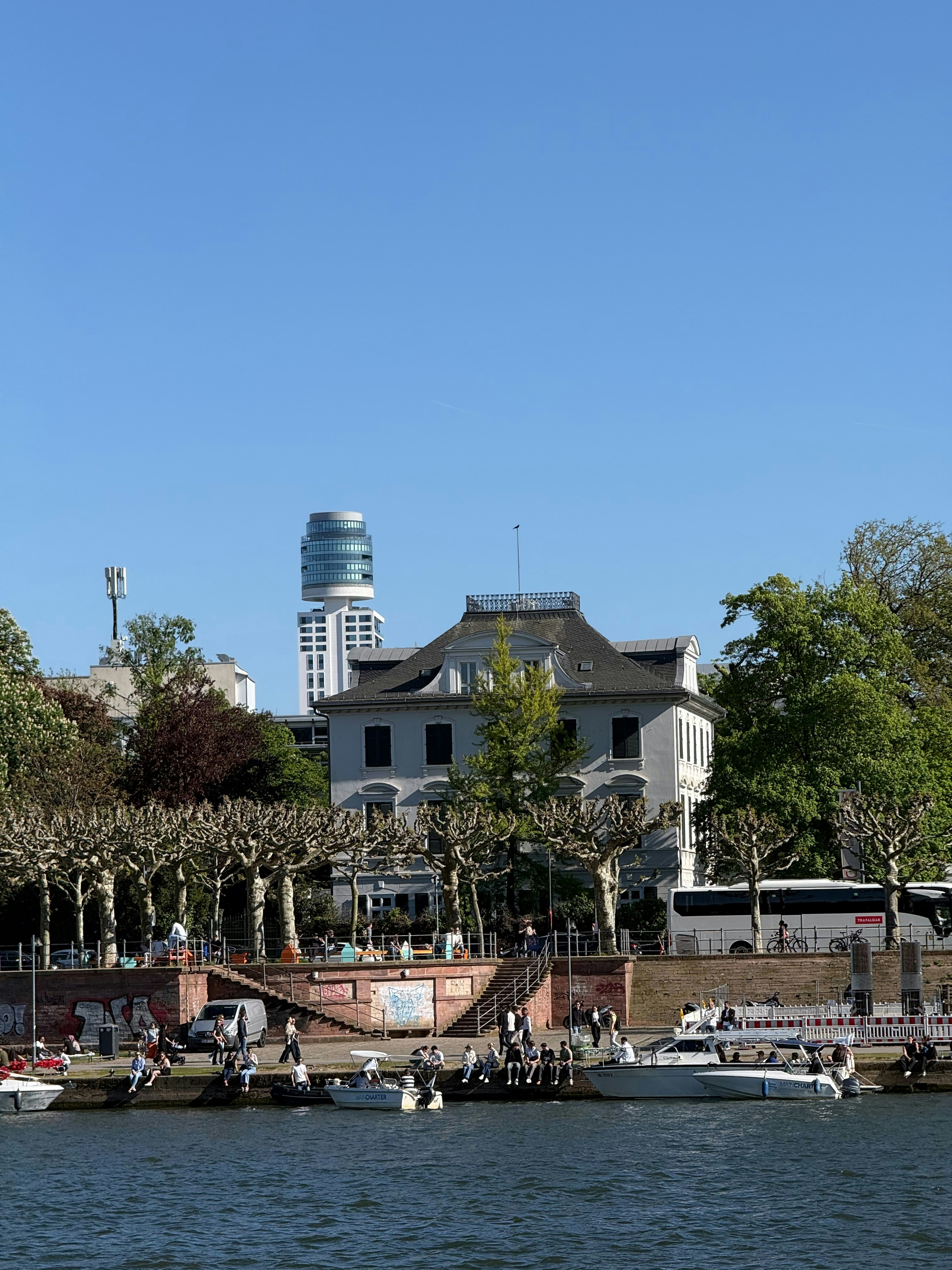 Harborfront Manor under a Clear Azure Sky