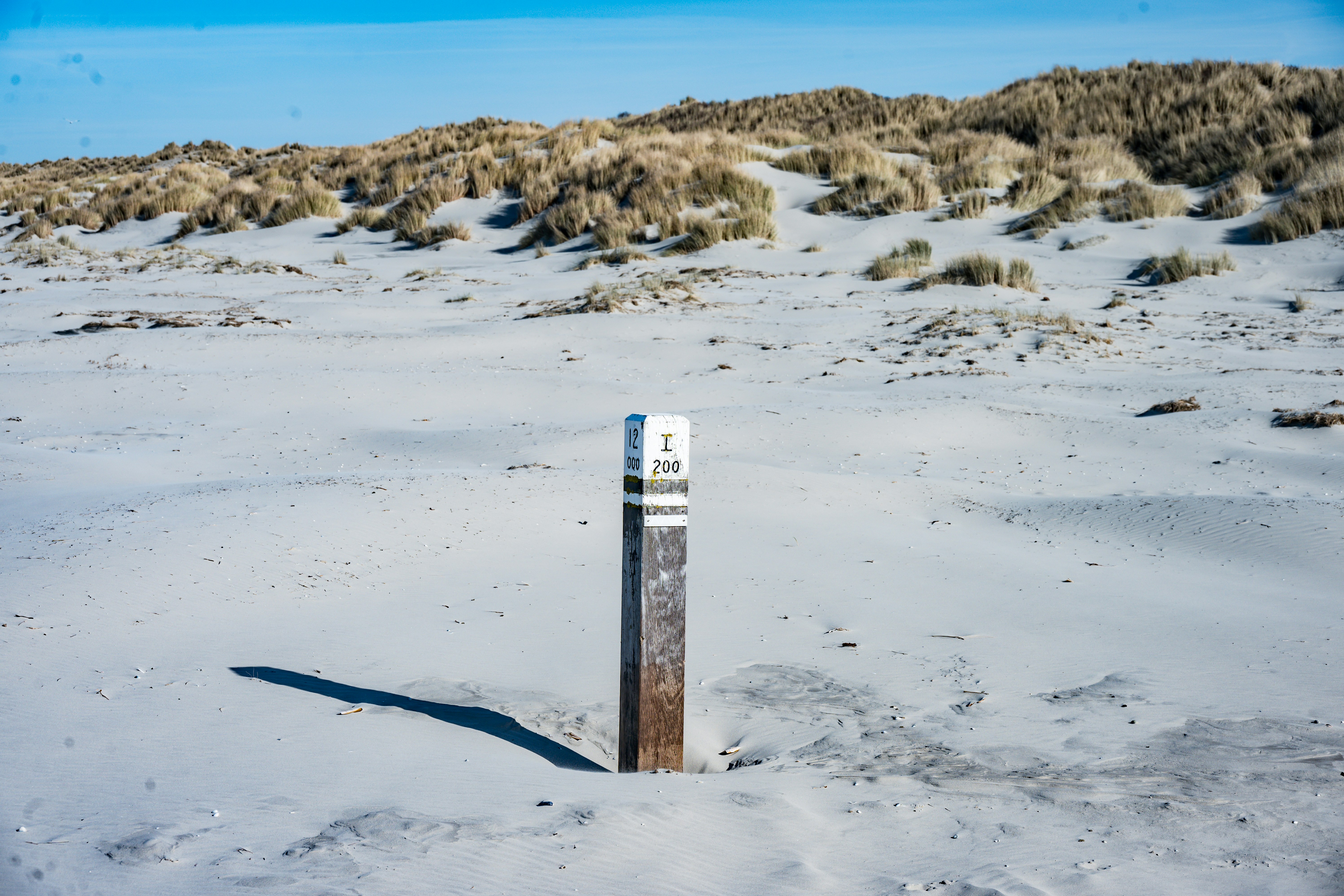 Silhouette Marker in Quiet Sand Dunes