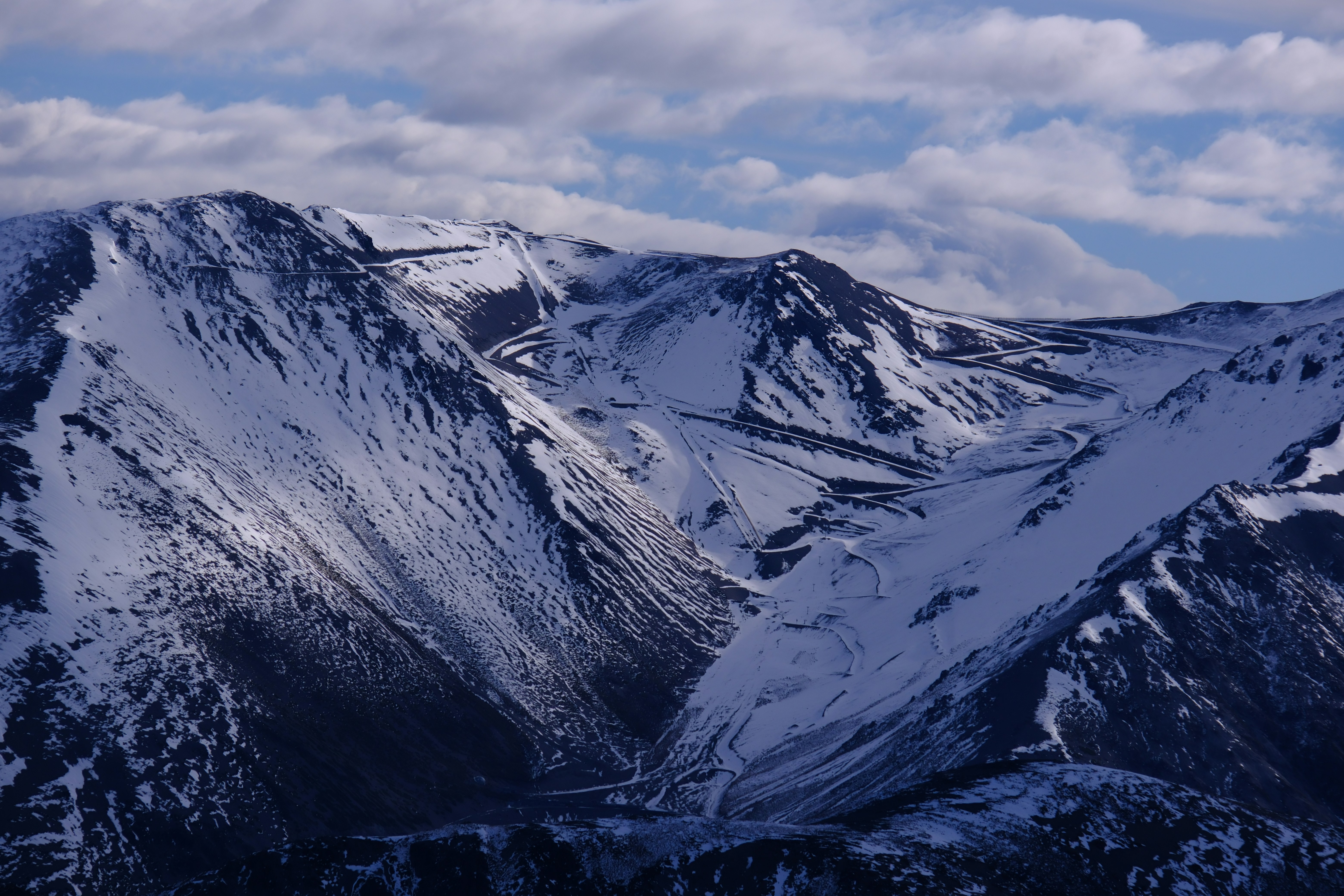 Snowbound Spine: A Serpentine Journey Through Alpine Ridges