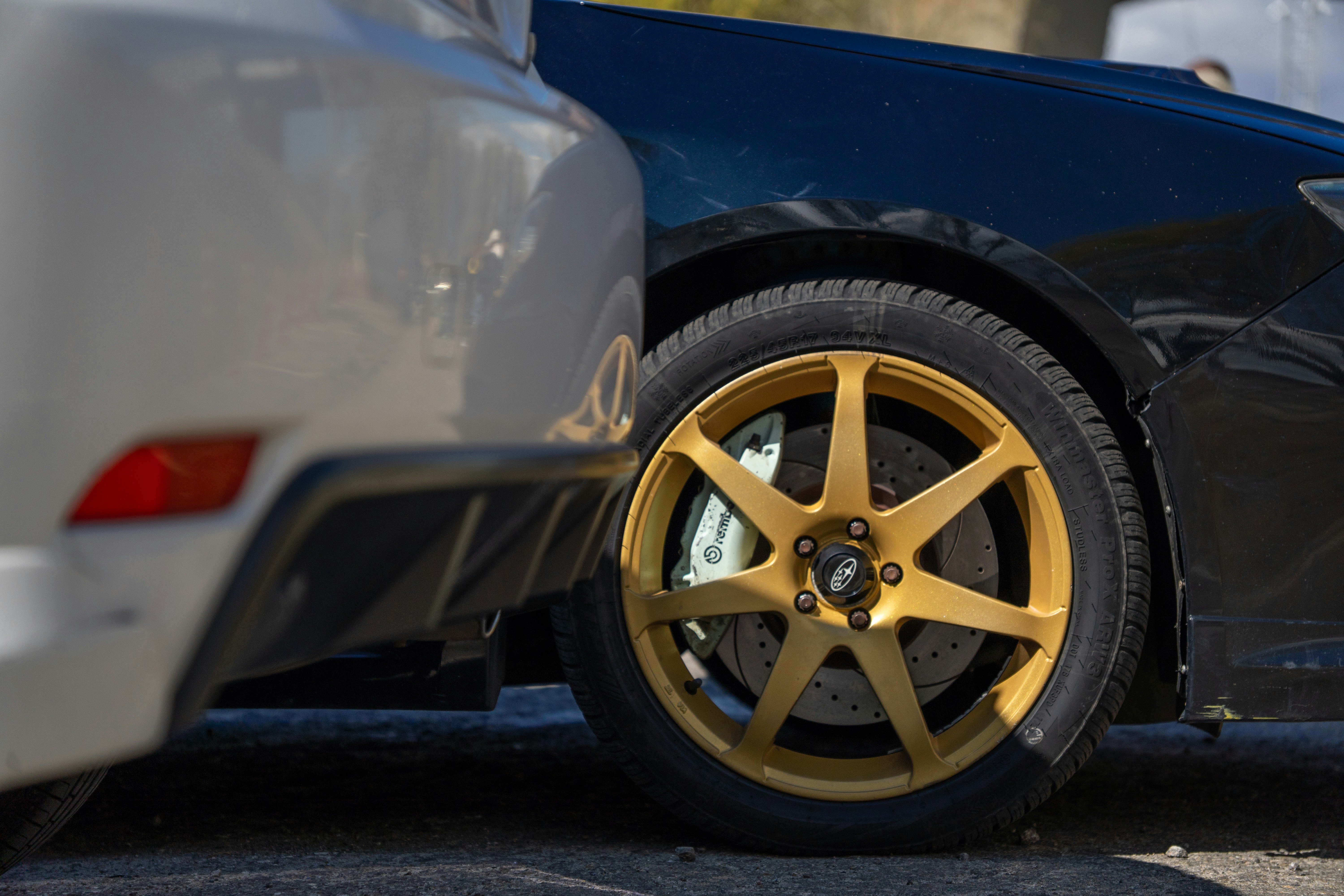 Golden Rim Under the Black Hood: A Stance of Power