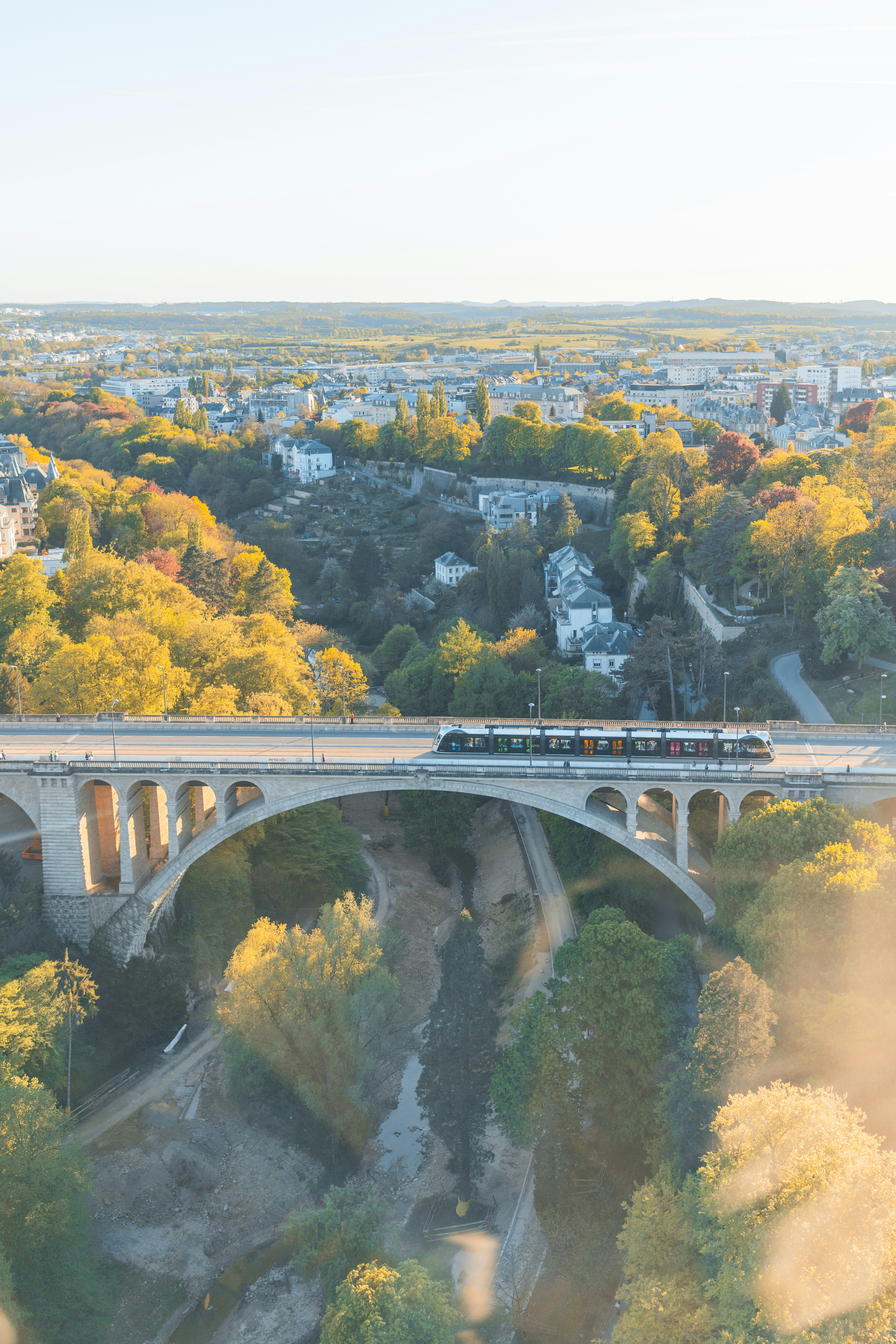 Aerial Bridge Transit Over Autumn Valley