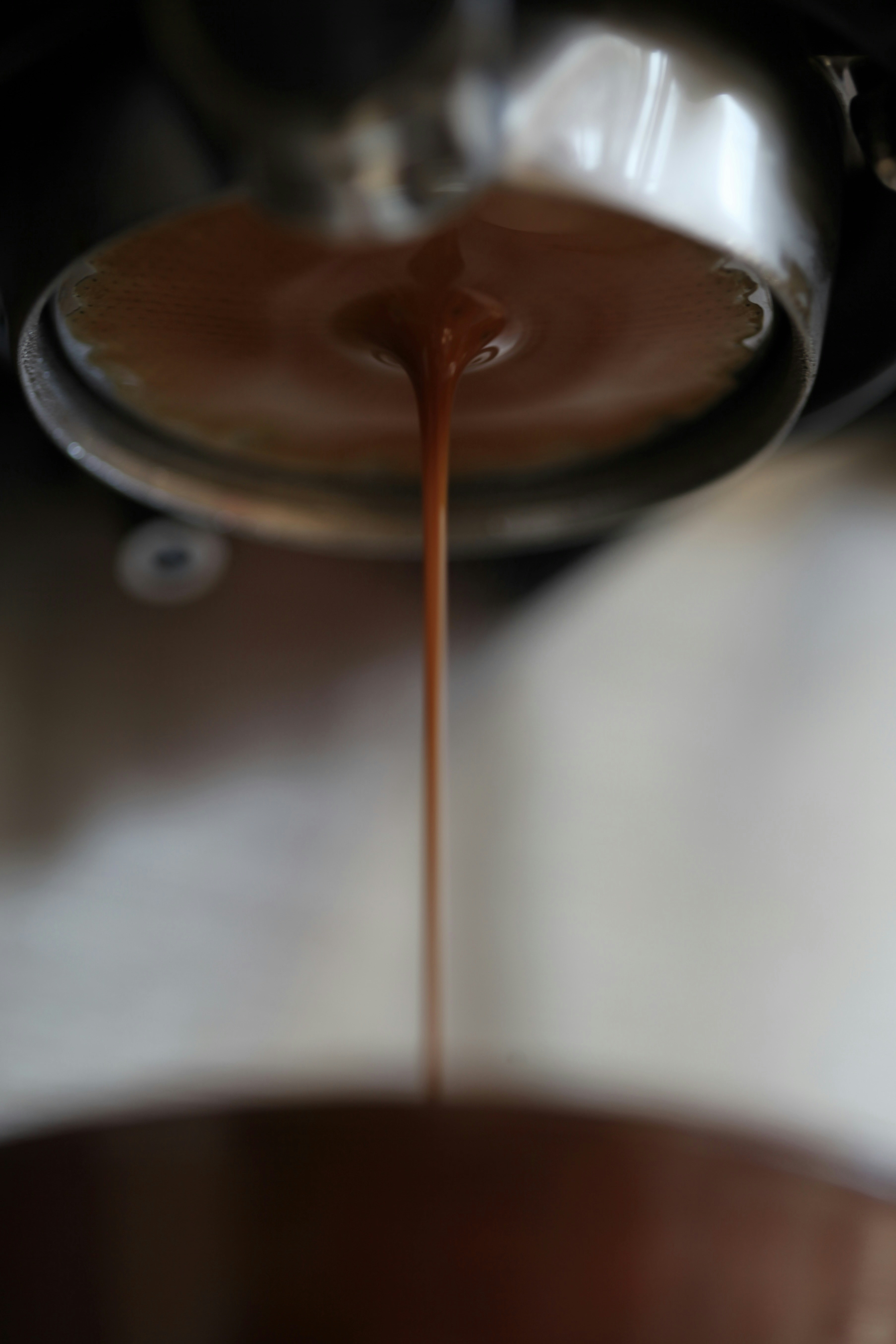 A Slender Thread: Espresso Flow Through the Nozzle
