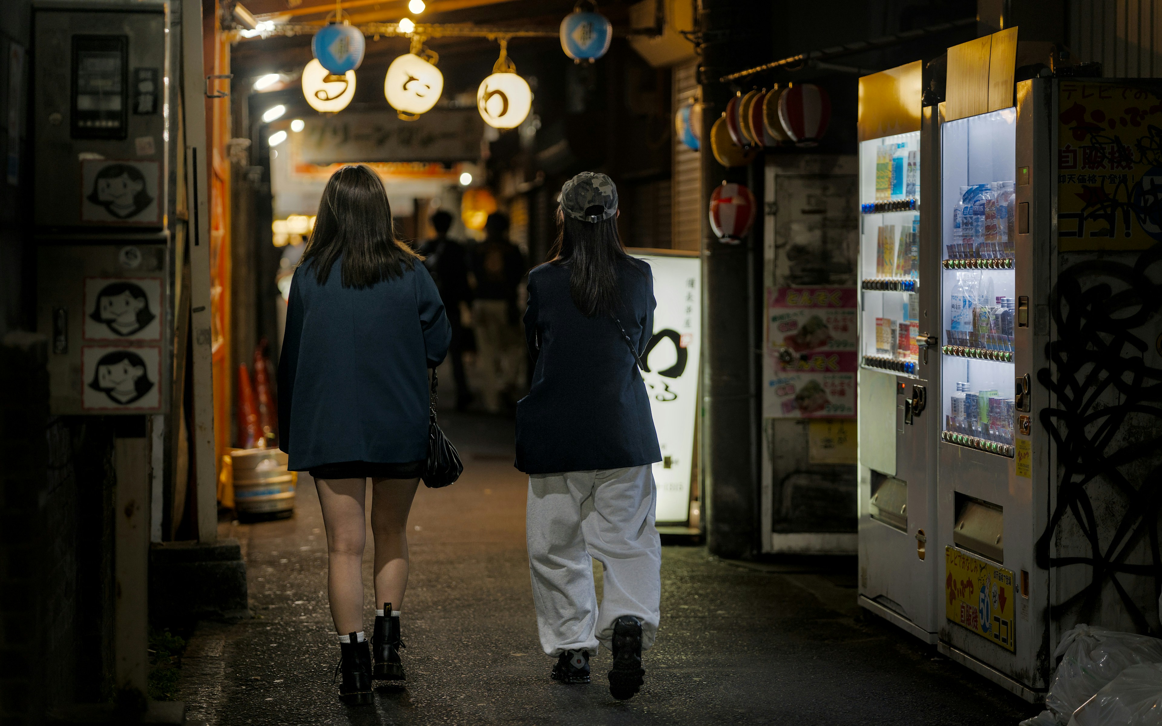 Night Market Walk: Two Figures in a Lantern-Lit Alley