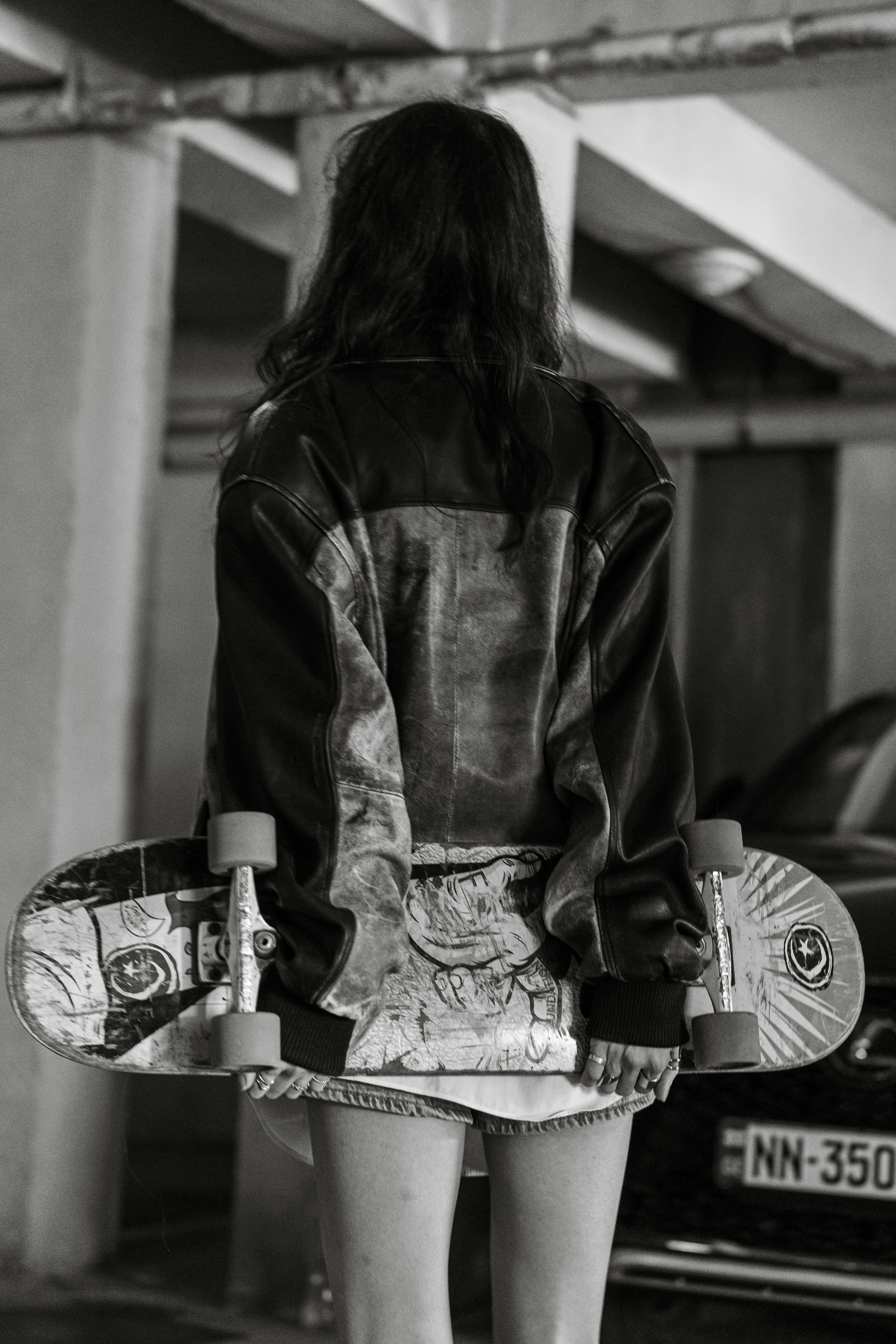 Back Turn: A Quiet Moment with a Street Skateboard