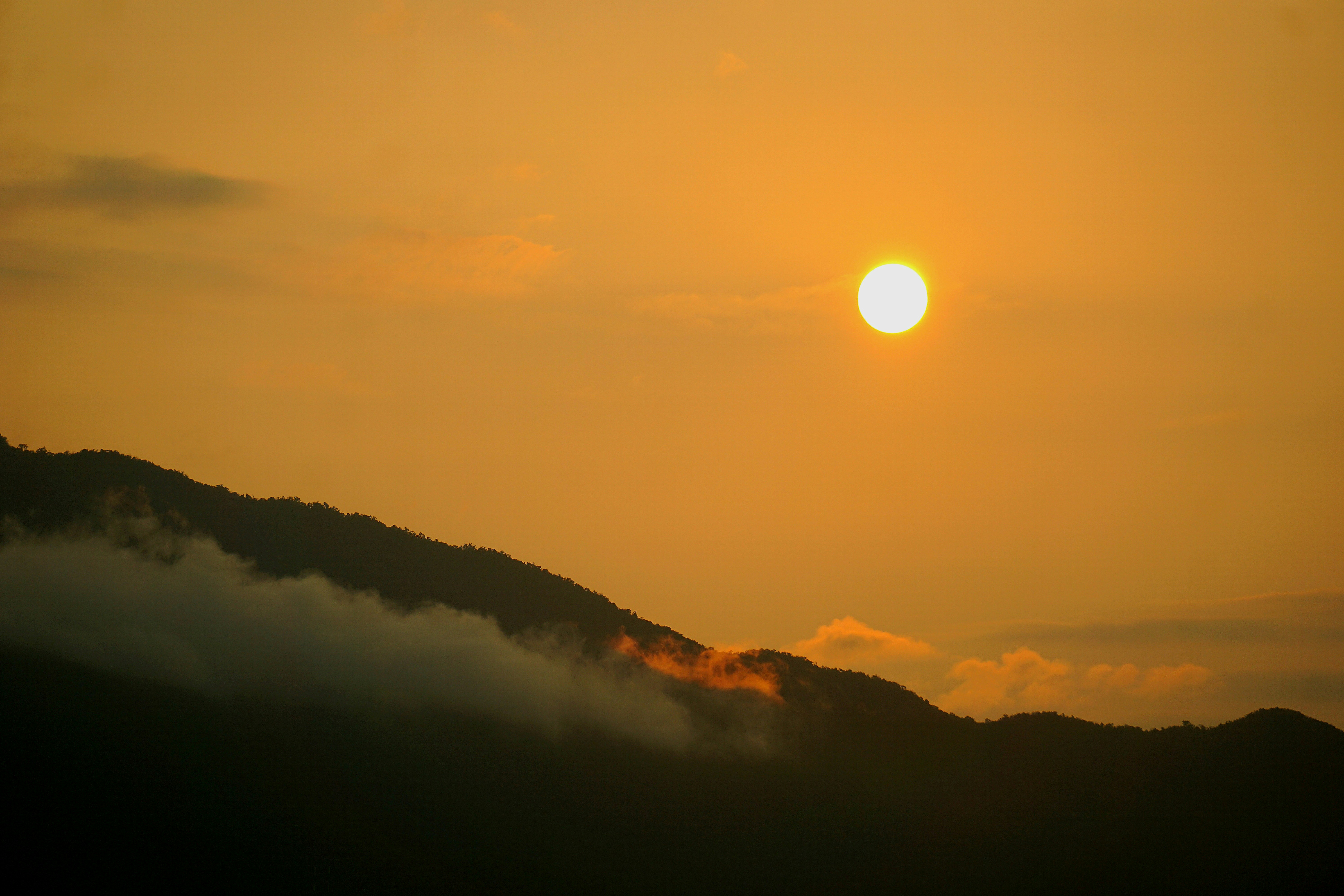 Sunlit Crest: A Quiet Sunset Over the Ridge