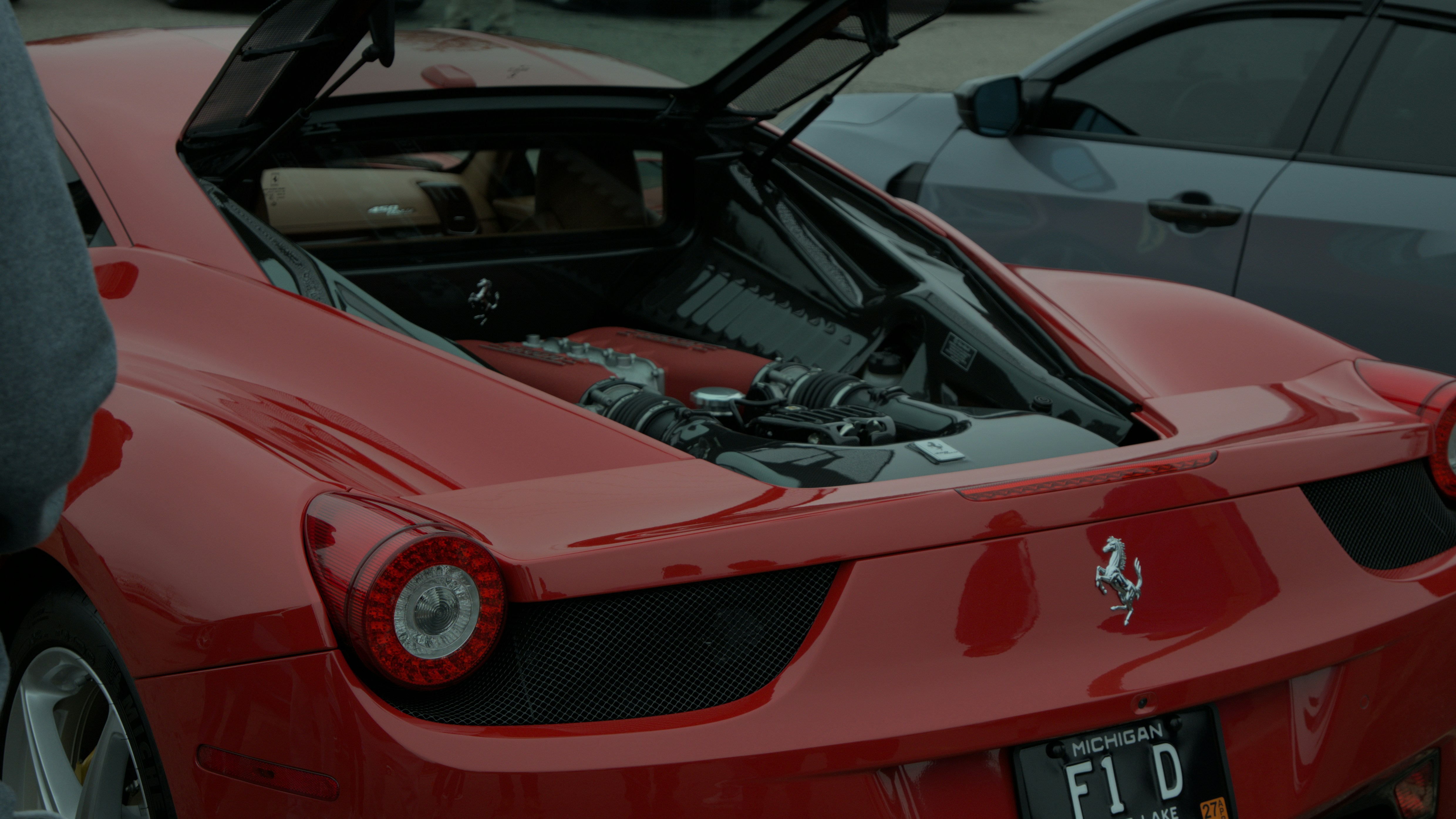 Red Ferrari Heartbeat: The Engine Bay and Brand Emblem