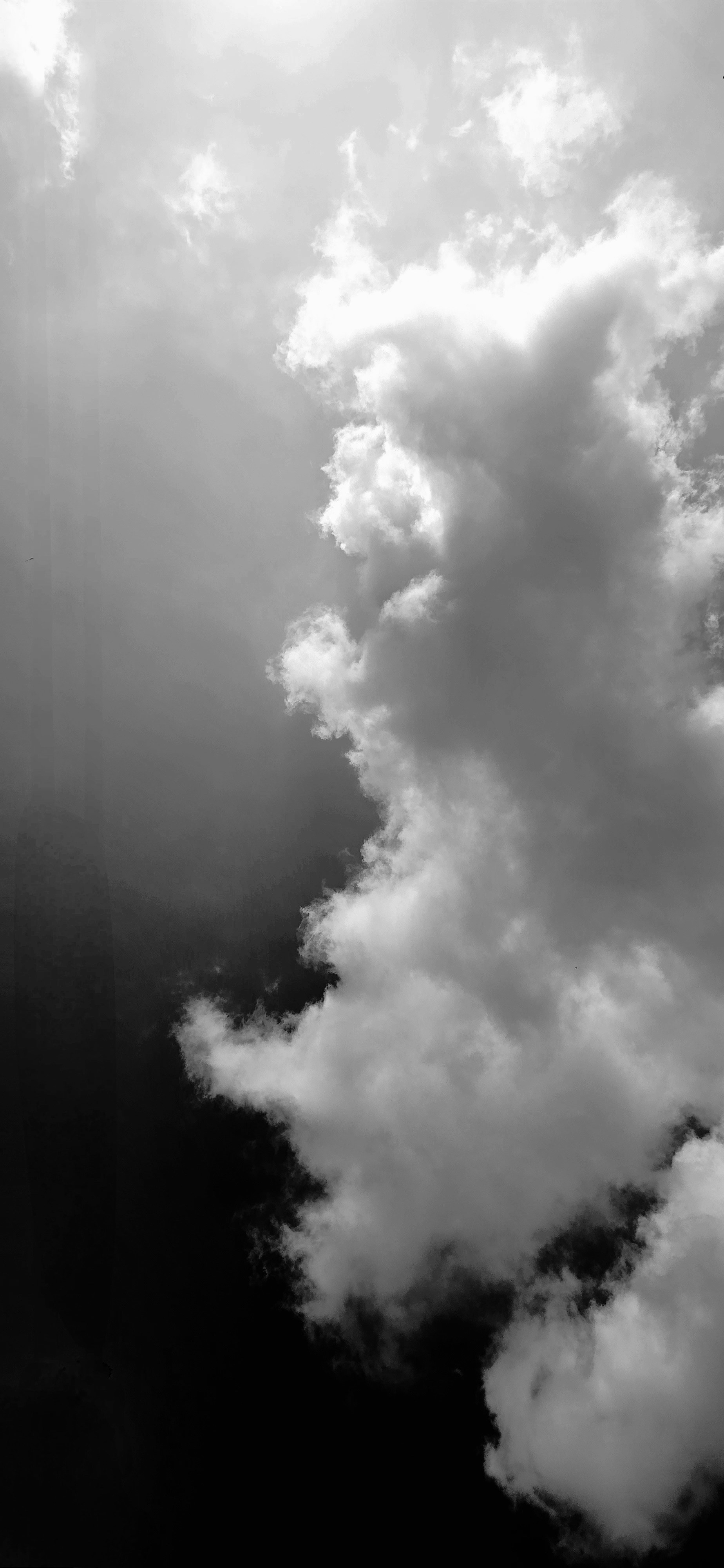 Vertical Skybound: A Narrow Strata of Clouds