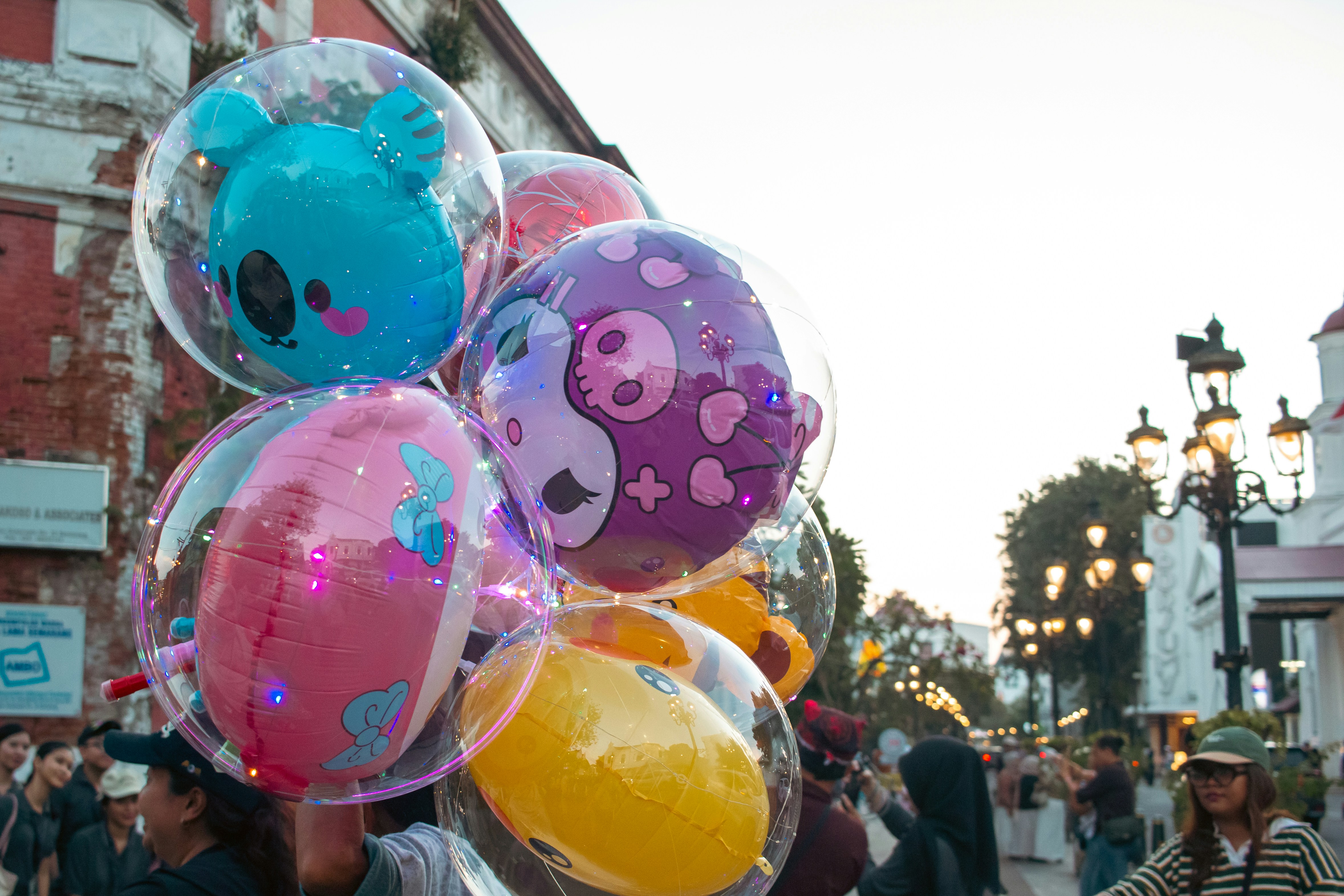 Bubble Parade: Colorful Balloons Crown a Busy Street