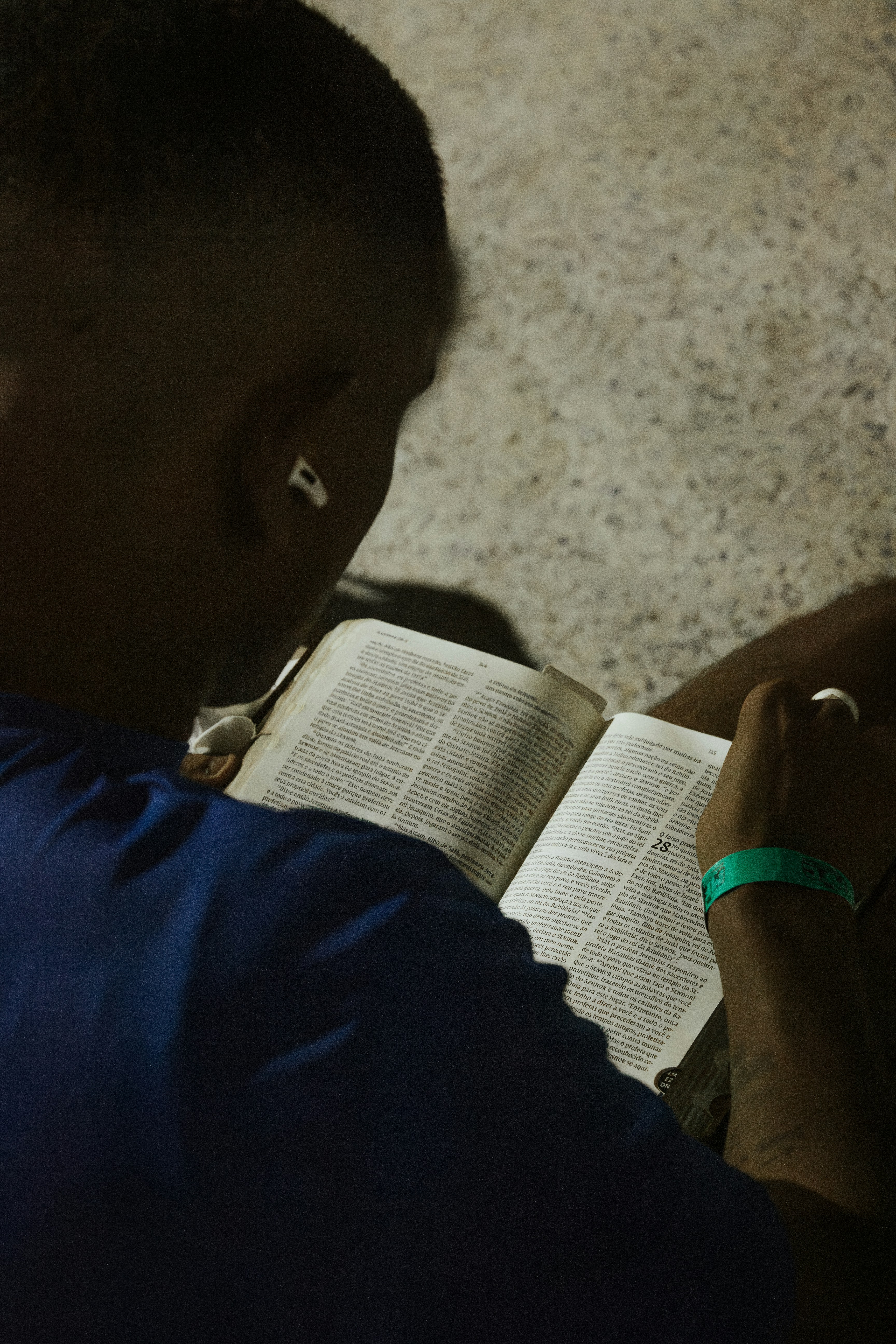 Quiet Study: A Teen Learns From the Page under Soft Classroom Light