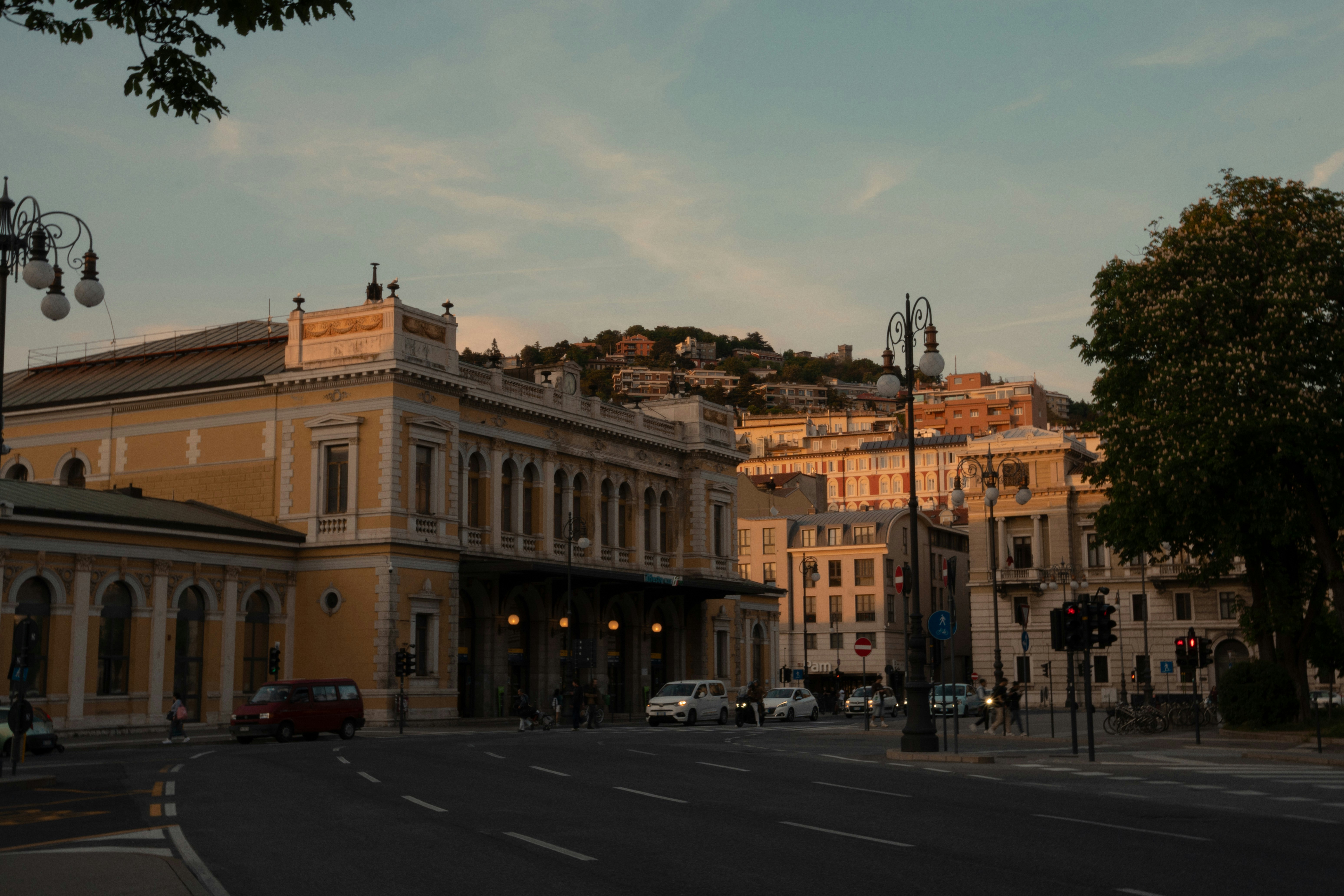 Pastel Boulevard at Golden Hour: Sunlit Facades and Quiet Traffic