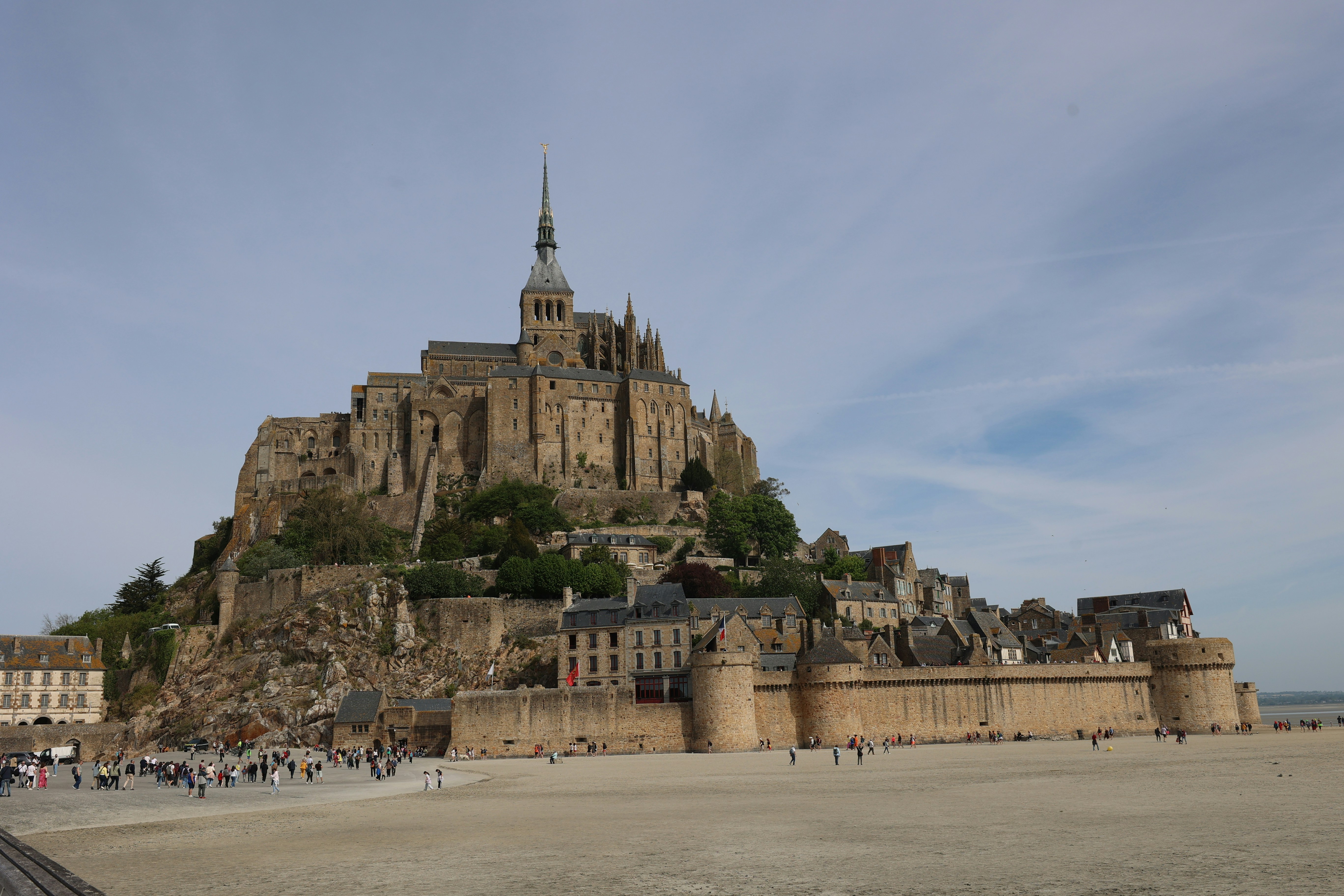 Mont Saint-Michel rising from the tidal flats at dusk
