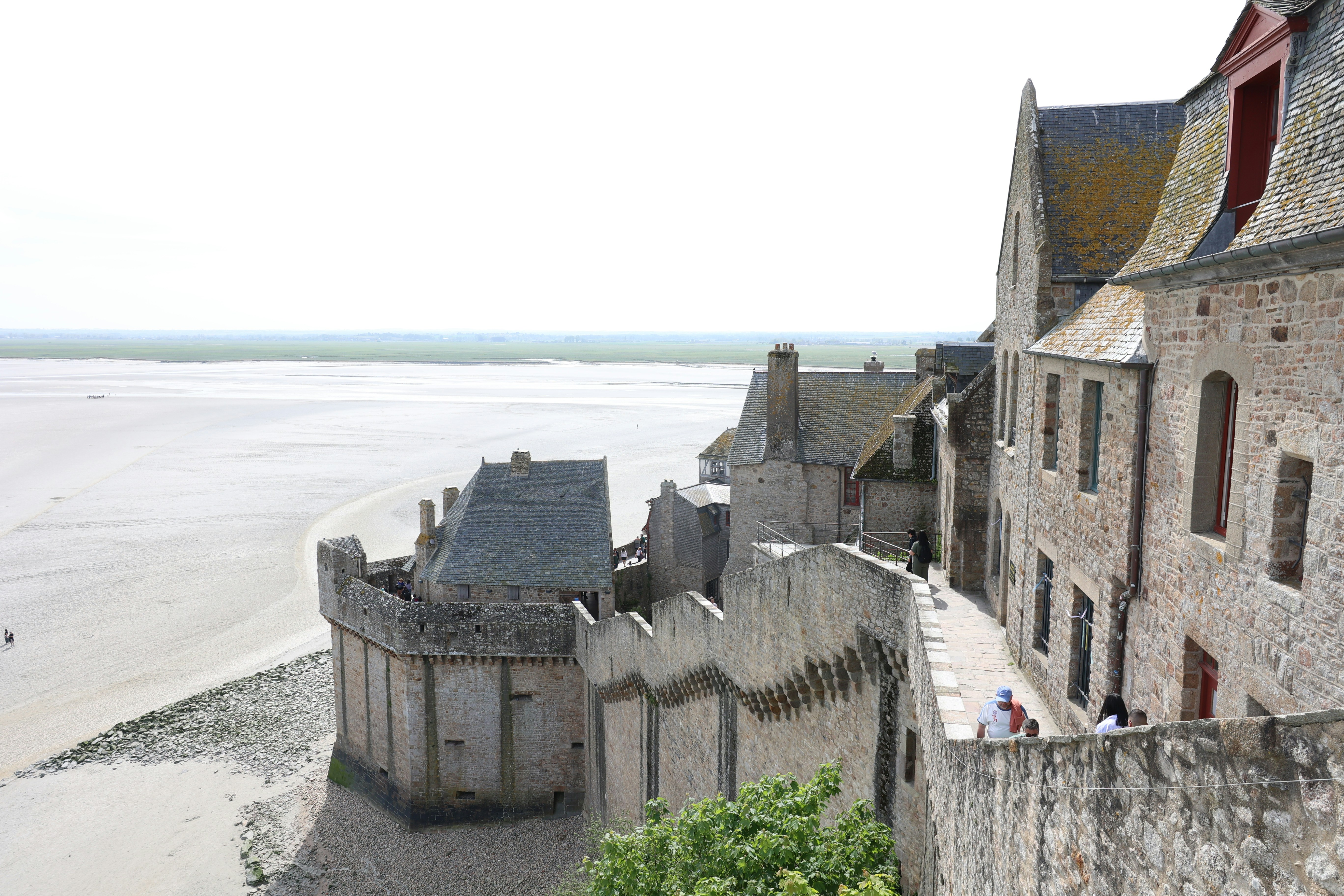 Fortified Cliffs and Coastal Village Edge