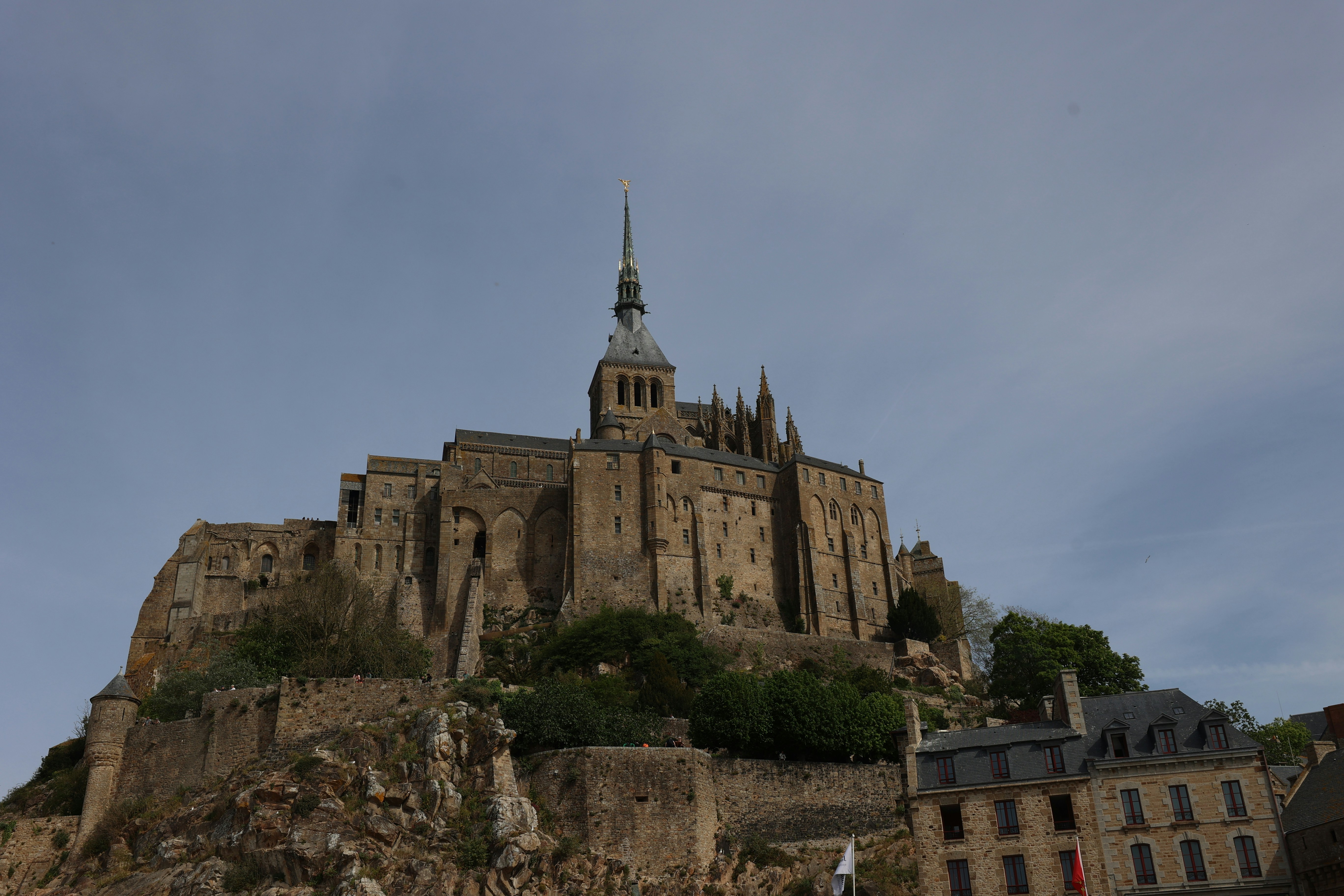Majestic hilltop fortress under a quiet sky