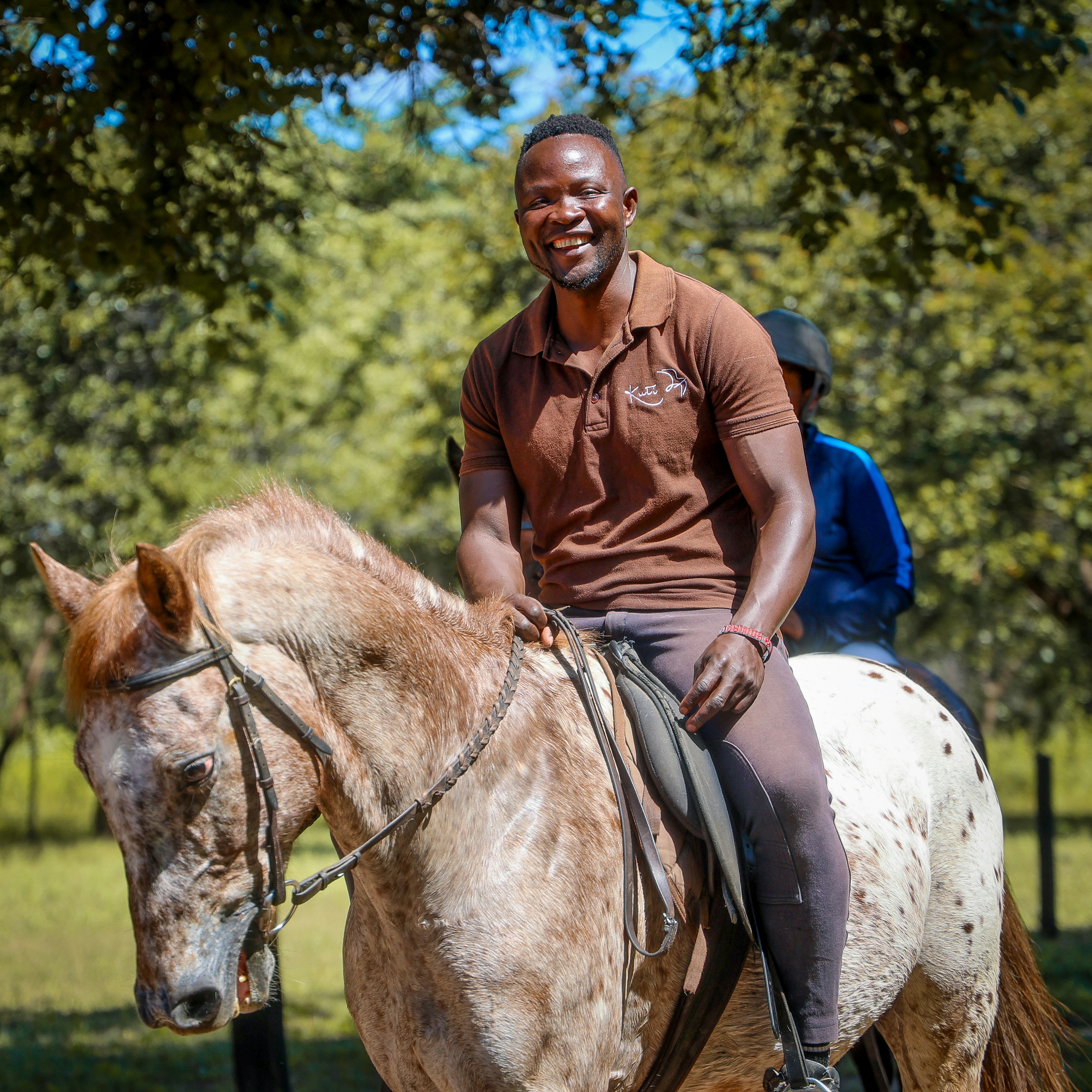 Rider's Warm Cadence: A Portrait Under the Oaks