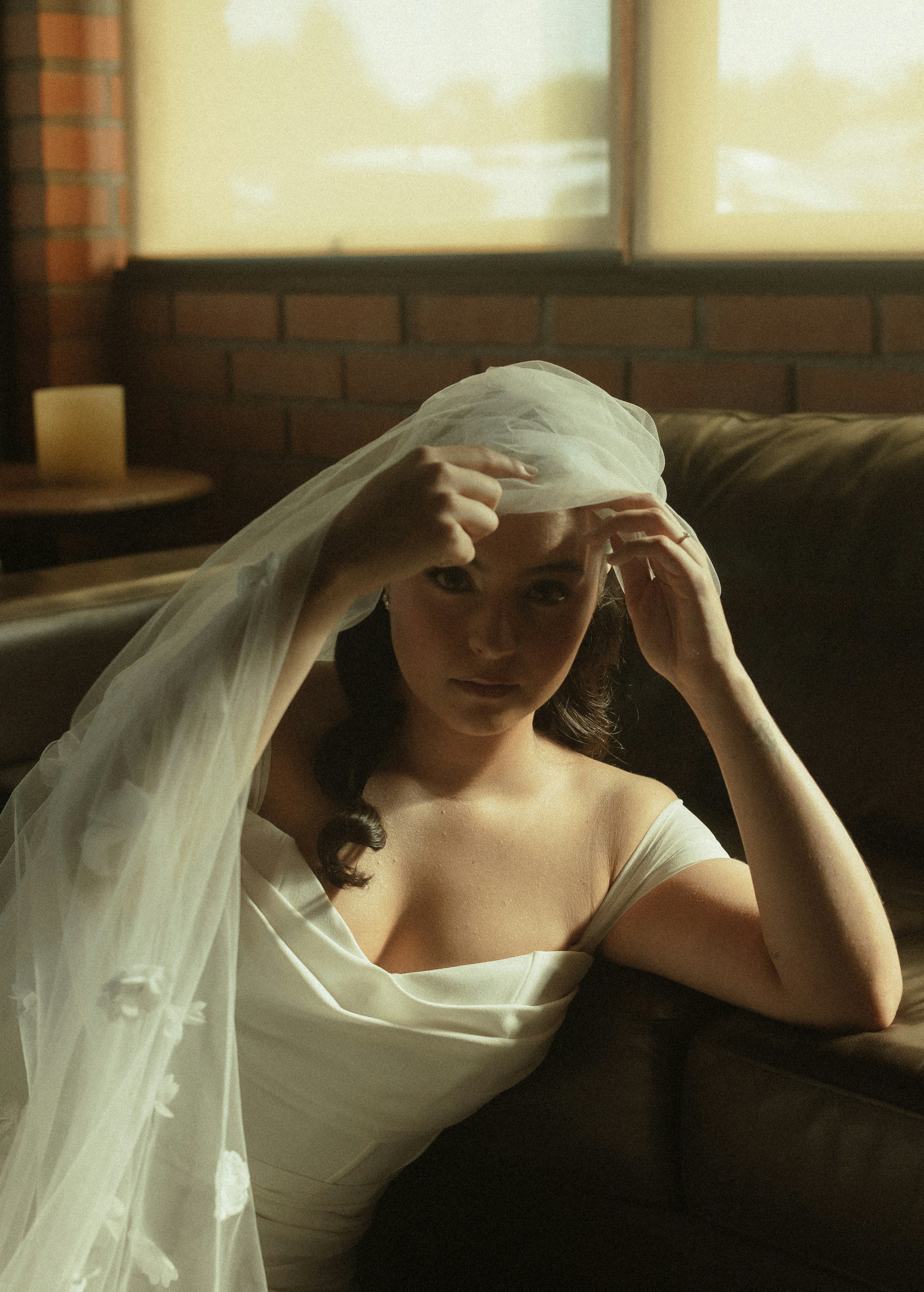 Veiled Bride: Quiet Moment with Soft Light and Draped Veil